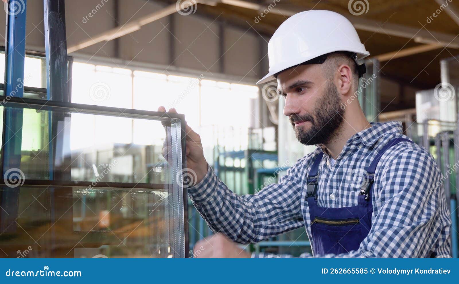 Professional Man Worker in Uniform and Helmet in a Window Warehouse ...