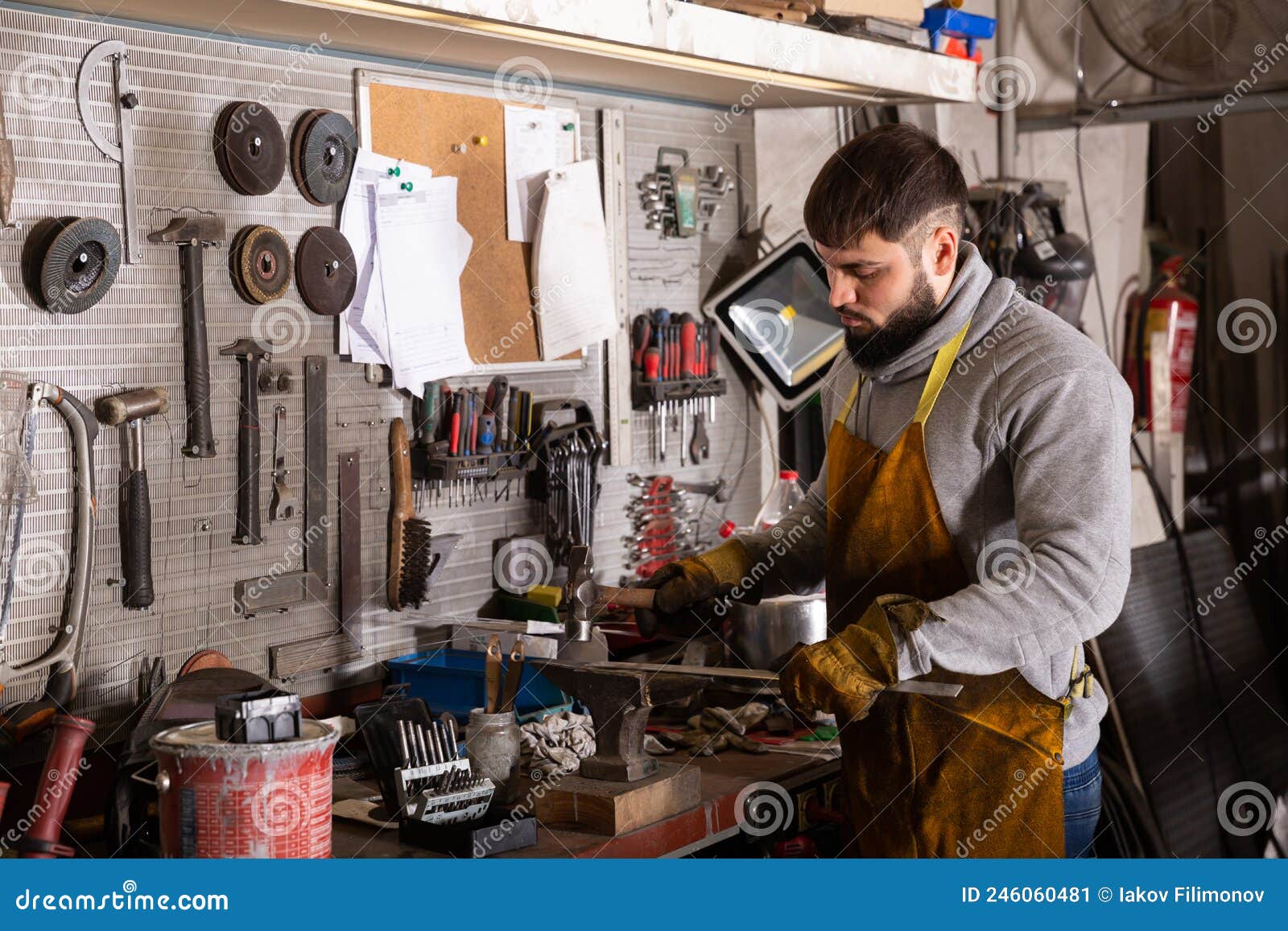 Professional Man Worker during Work with Steel in Workshop Stock Image ...