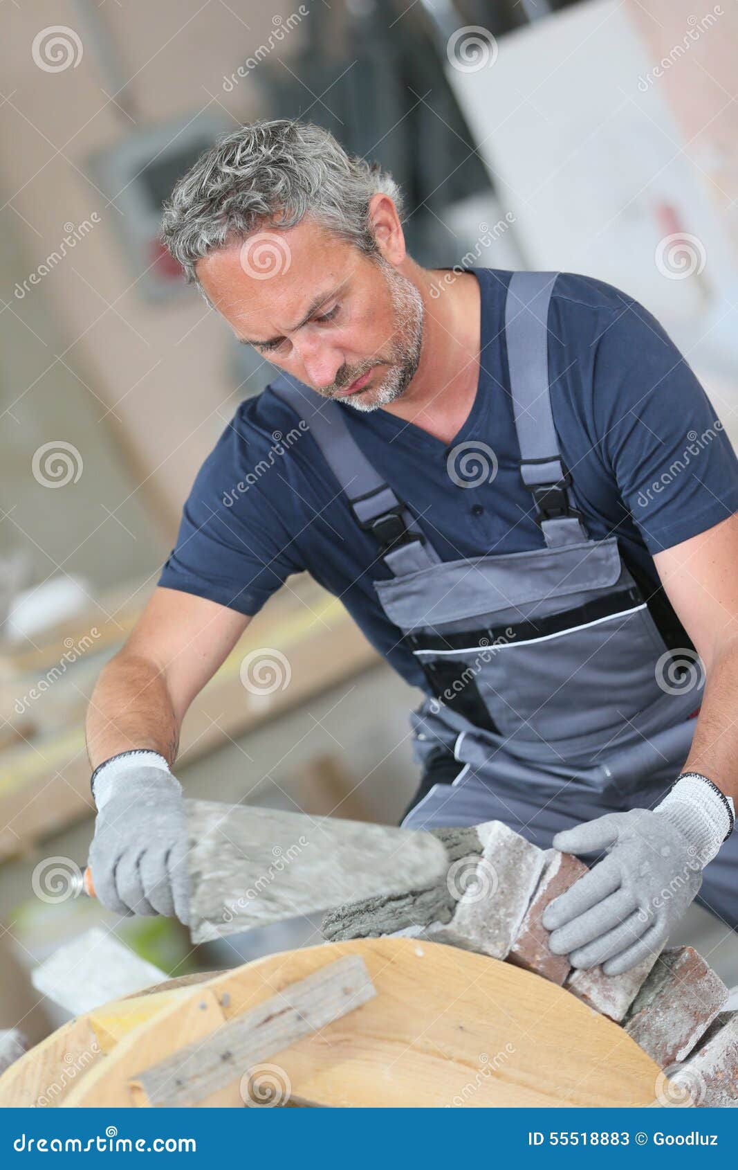 Professional mason at work stock image. Image of brick - 55518883
