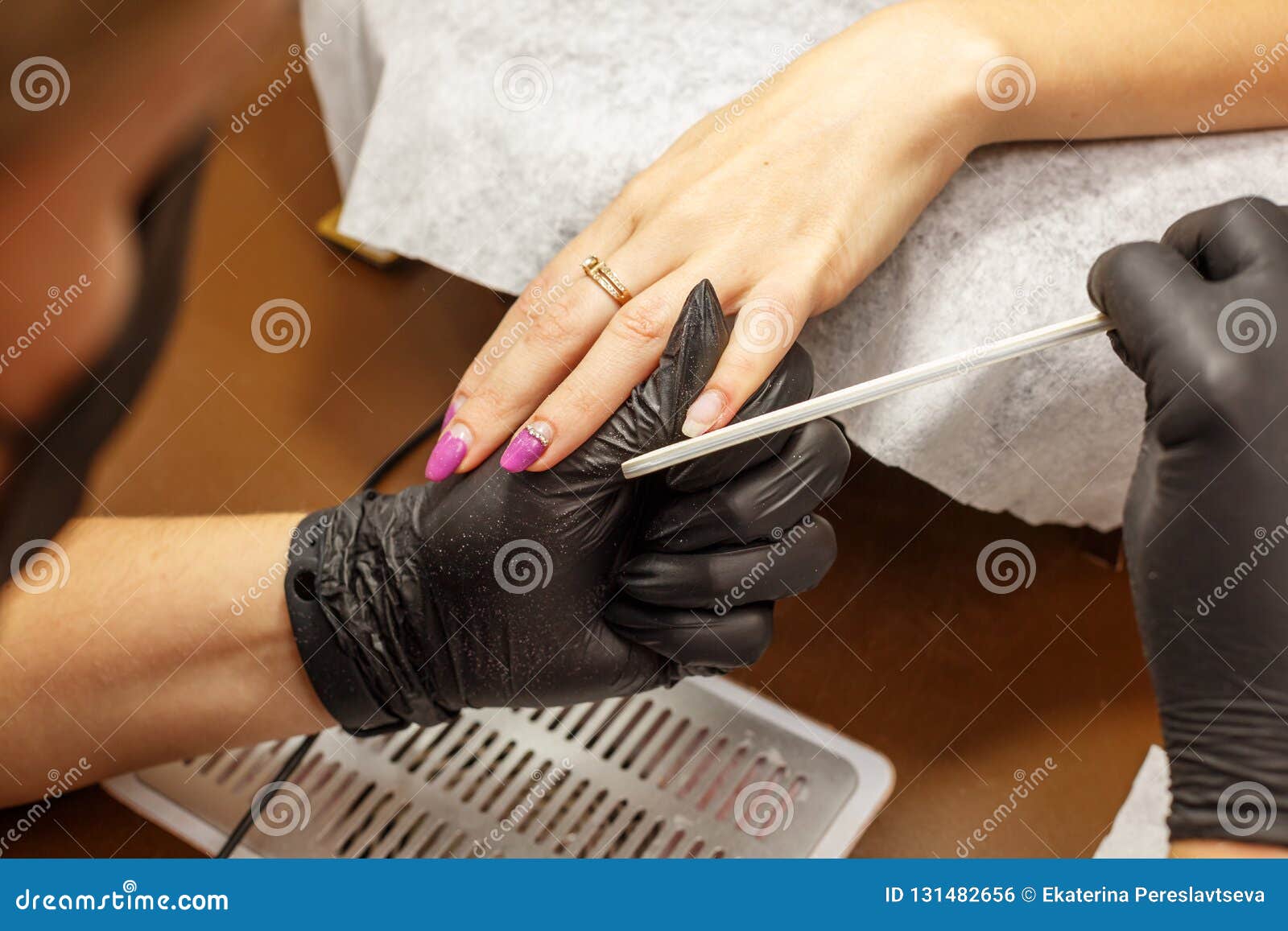 Professional Master of Manicure Makes the Nails To the Client Stock ...