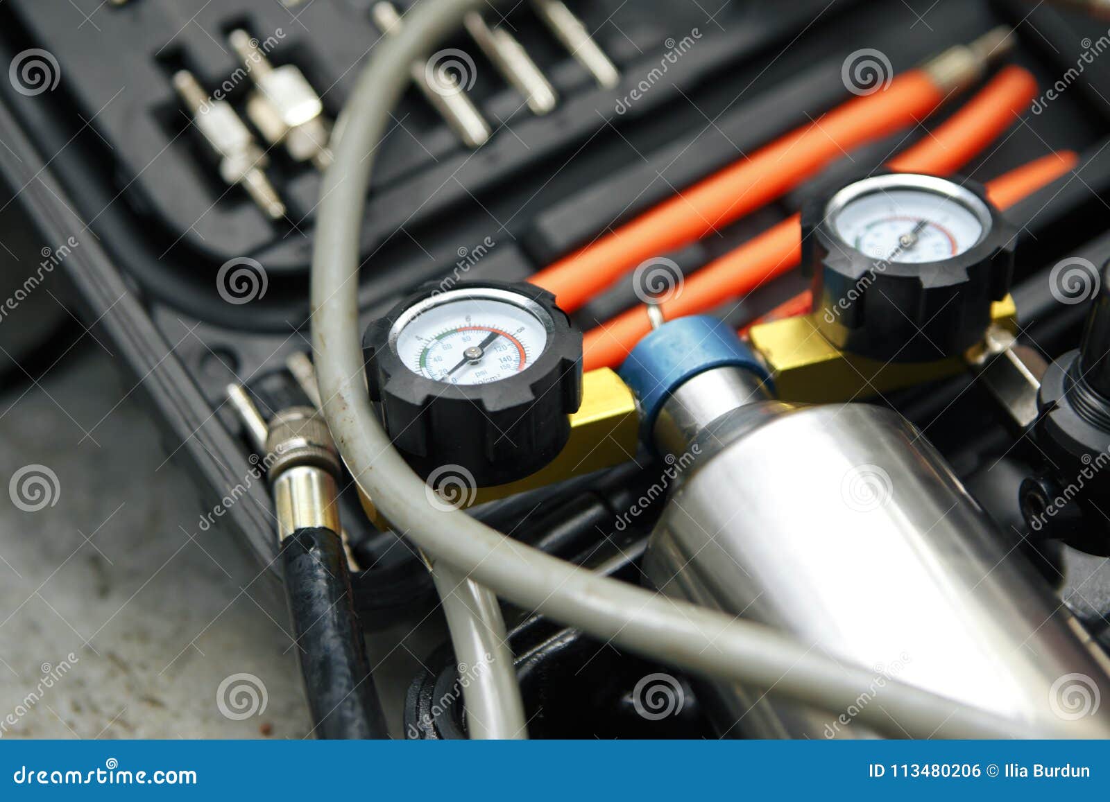 Professional Mechanic Testing Diesel Injector in His Workshop. Stock ...