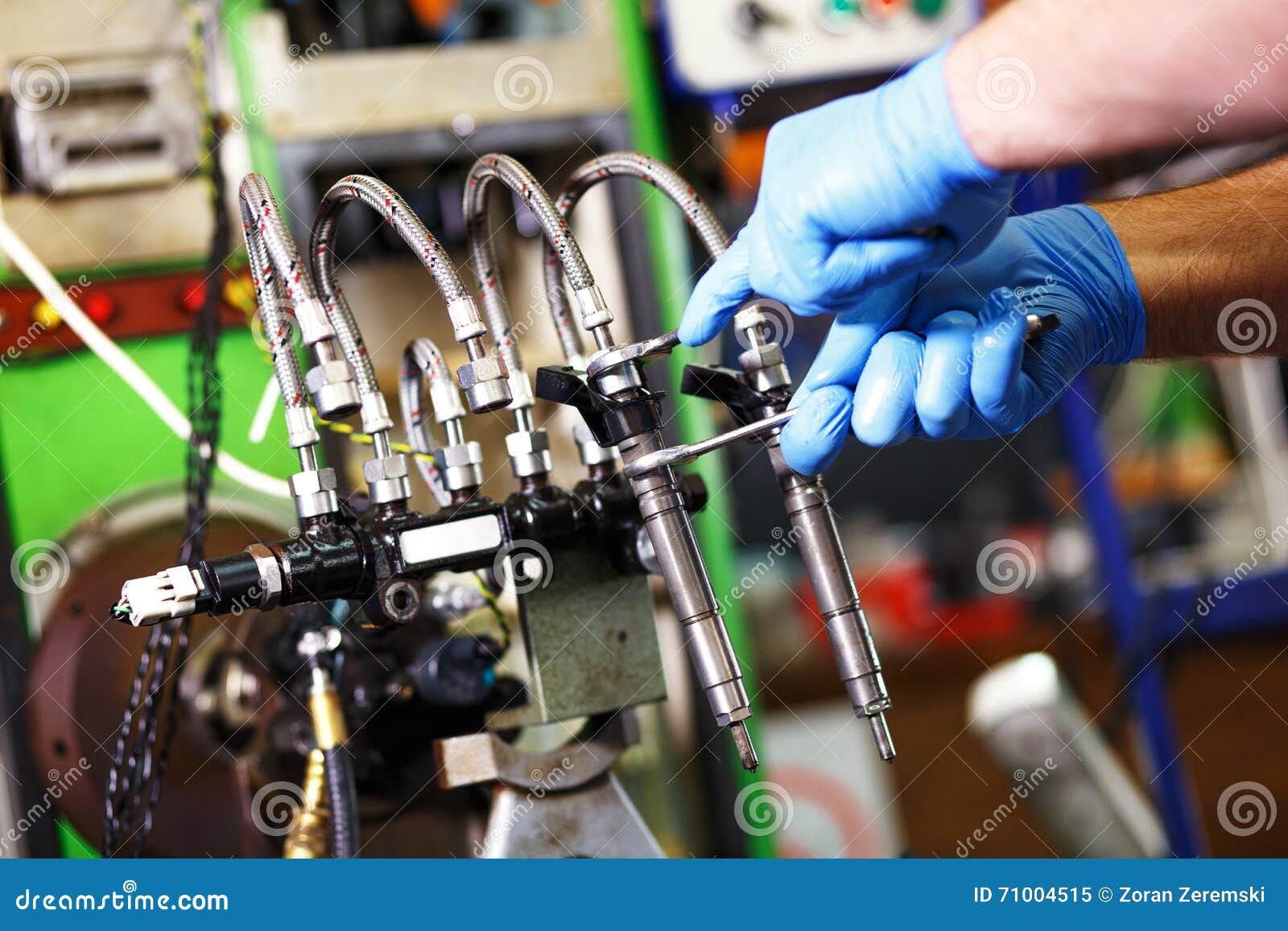 Professional Mechanic Testing Diesel Injector in His Workshop Stock ...