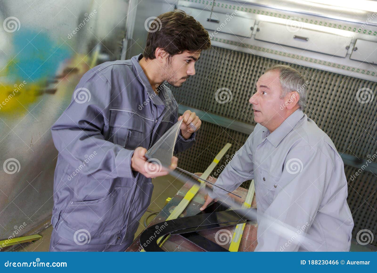 Professional Metallurgist with Apprentice Stock Photo - Image of ...