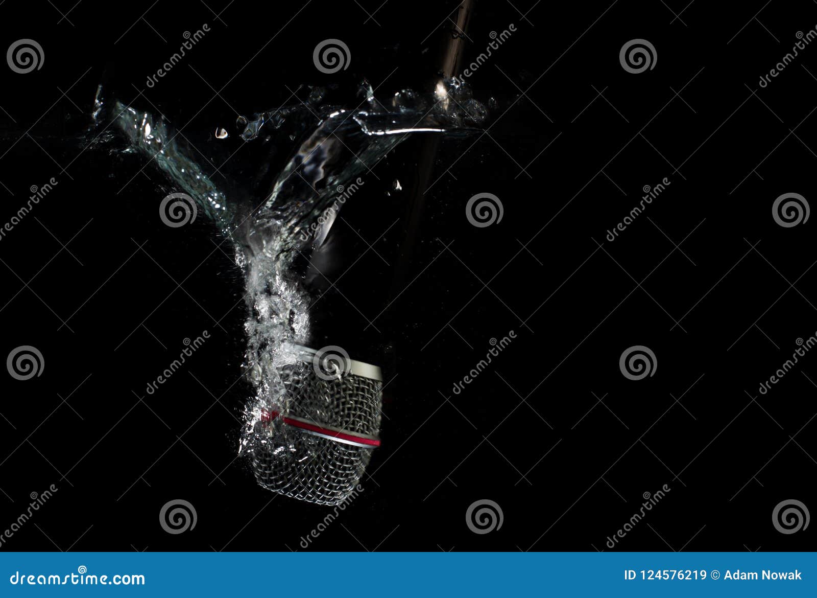 Microphone Splashing Into Water On Black Background Royalty-Free Stock ...