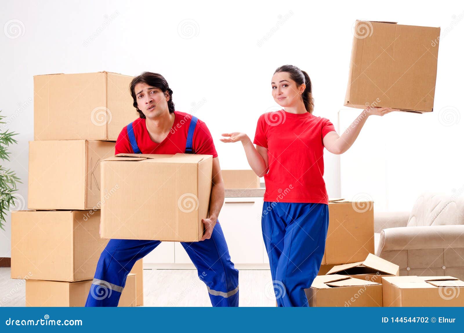 The Professional Movers Doing Home Relocation Stock Photo - Image of ...