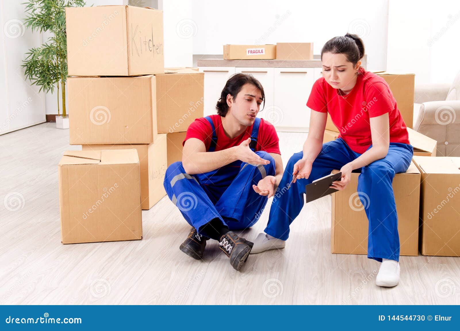 The Professional Movers Doing Home Relocation Stock Photo - Image of ...