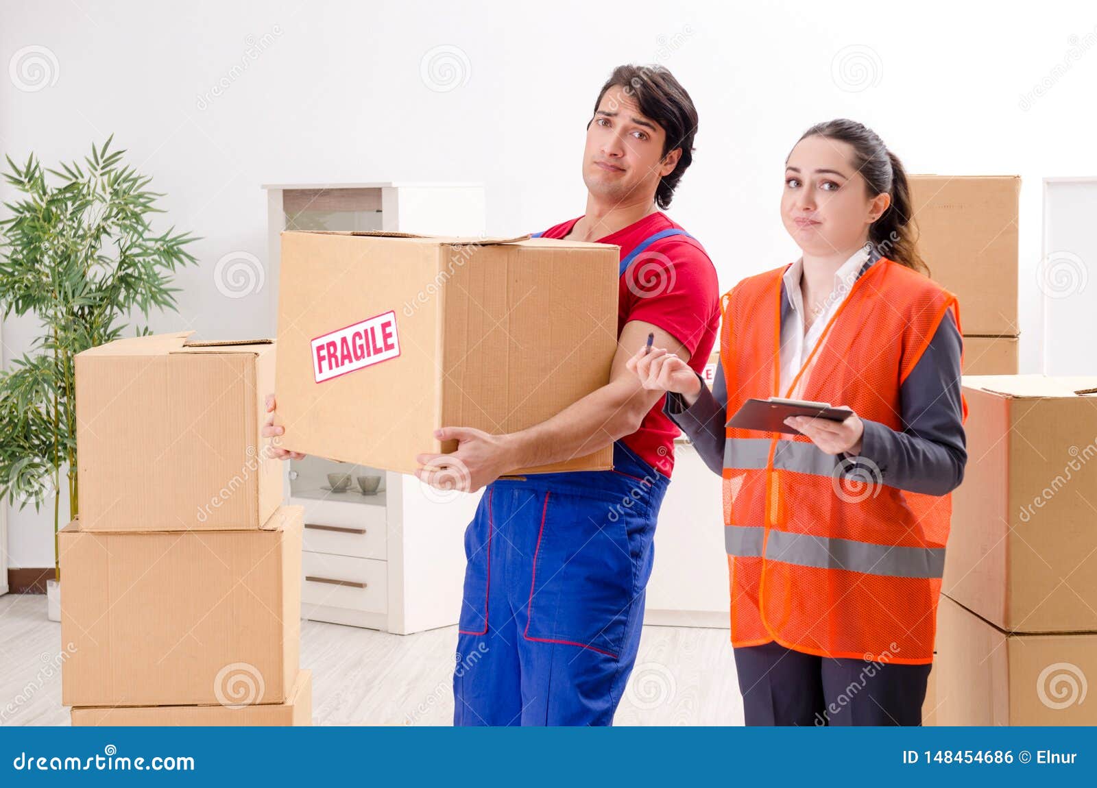 The Professional Movers Doing Home Relocation Stock Photo - Image of ...