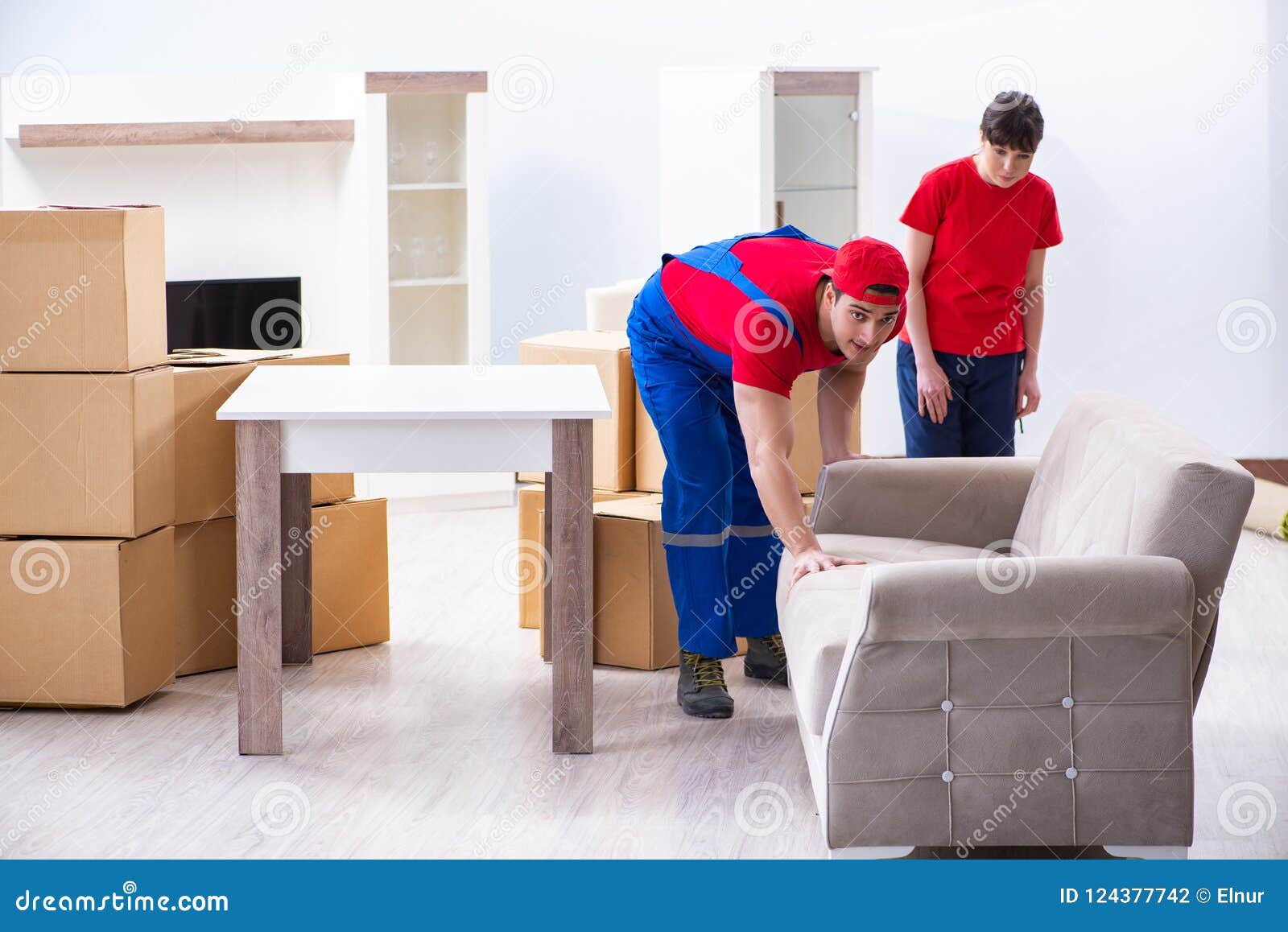 The Professional Movers Doing Home Relocation Stock Photo - Image of ...