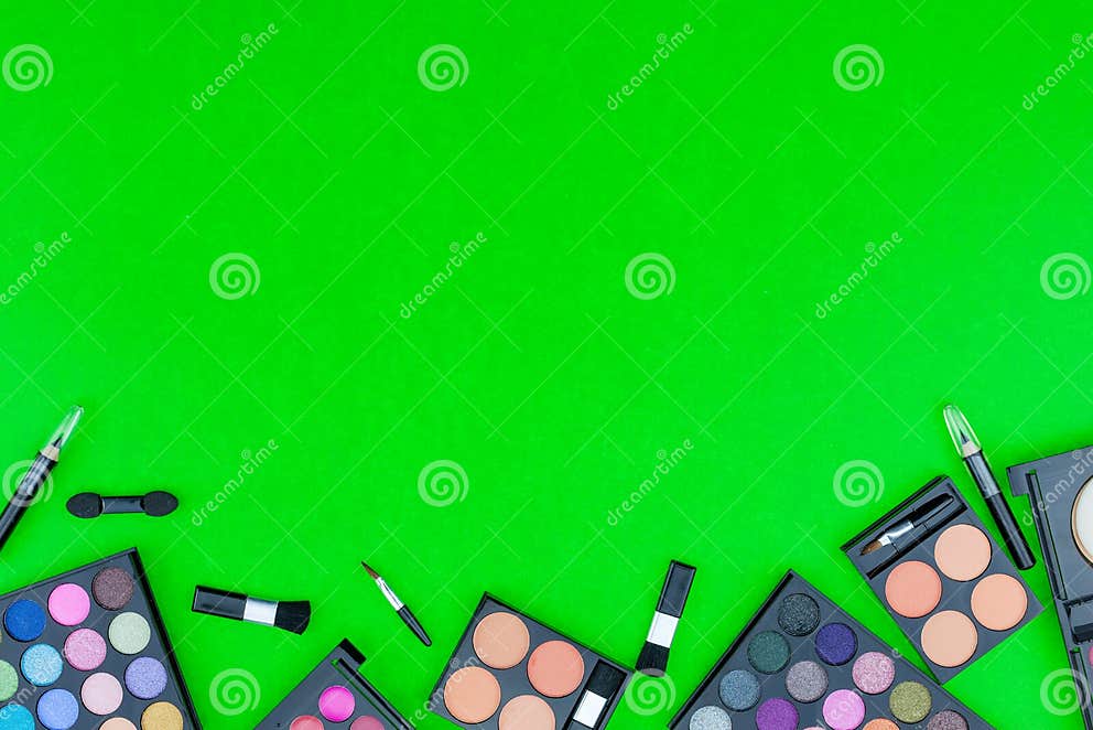 Professional Multi Colored Makeup and Brushes on Green Background Copy ...