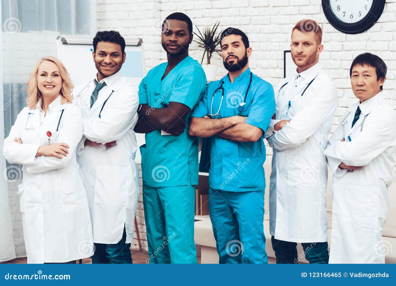 Professional Multinational Doctors Camera Posing. Stock Image - Image ...