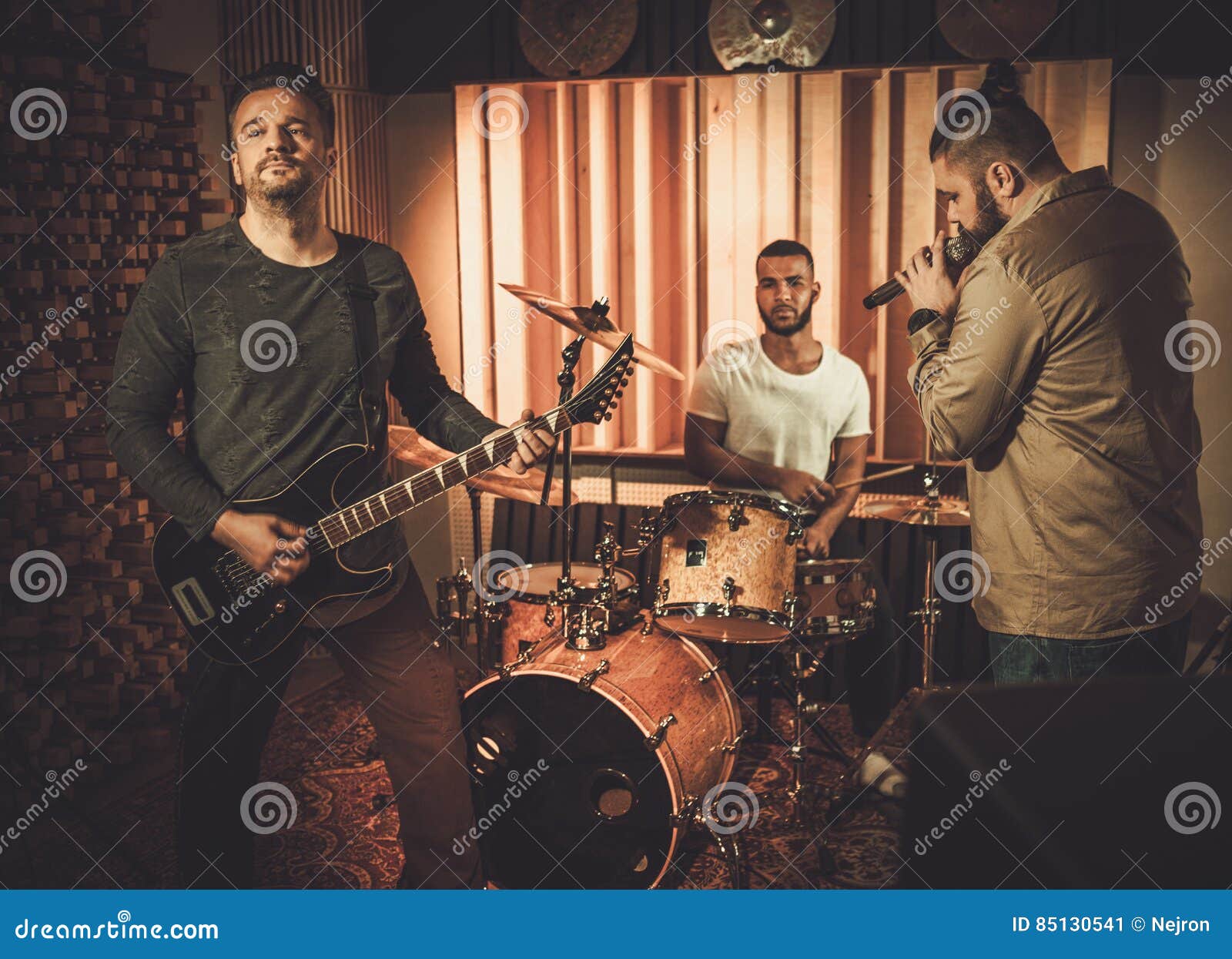 Professional Music Band Performing in Boutique Recording Studio Stock ...