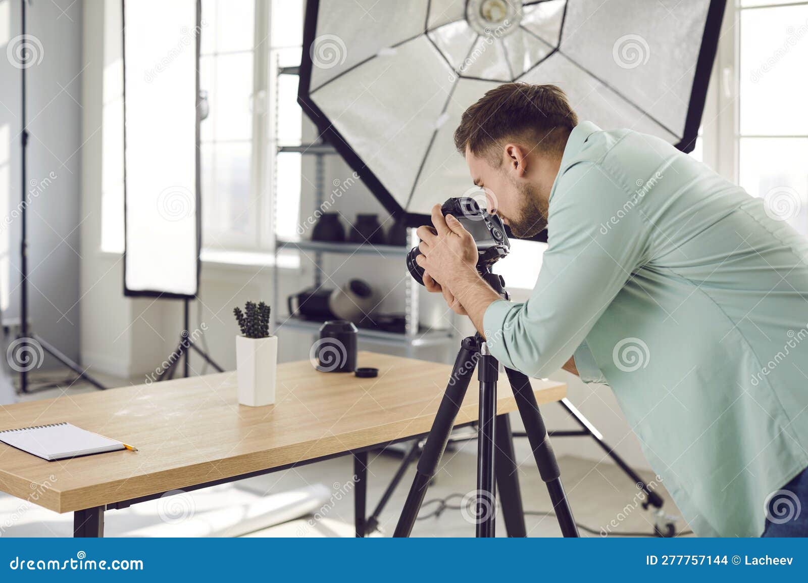 Professional Object Photographer Working in His Studio and Taking ...