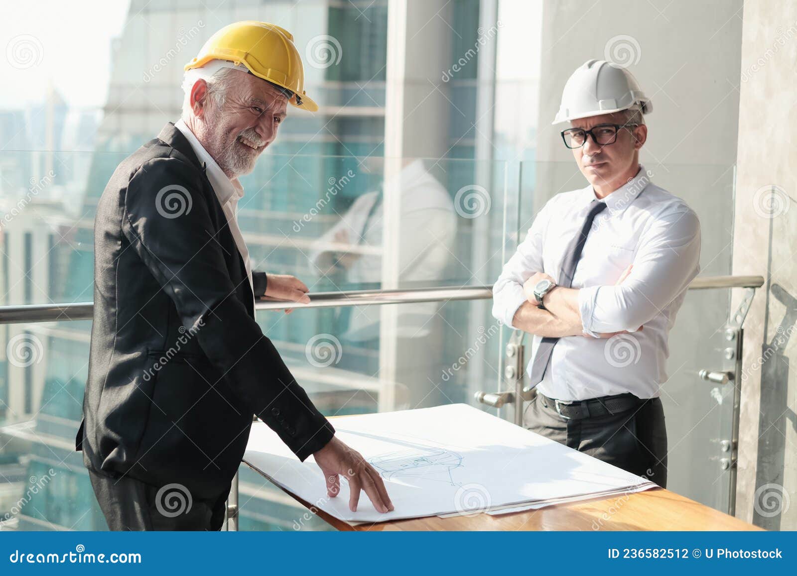 Professional Old Architect and Senior Foreman are Talking the Project ...