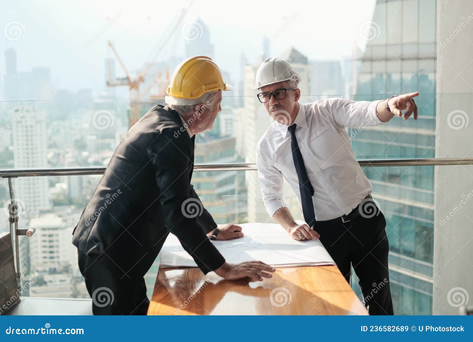 Professional Old Architect and Senior Foreman are Talking the Project ...