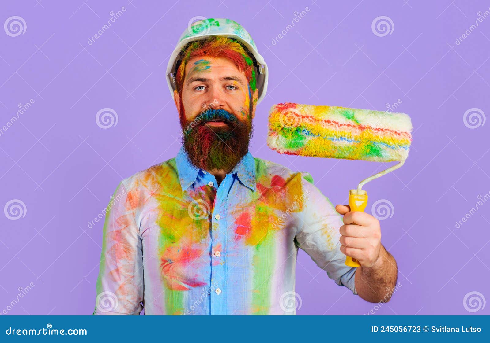 Professional Painter in Hard Hat with Paint Roller. Builder in Safety ...