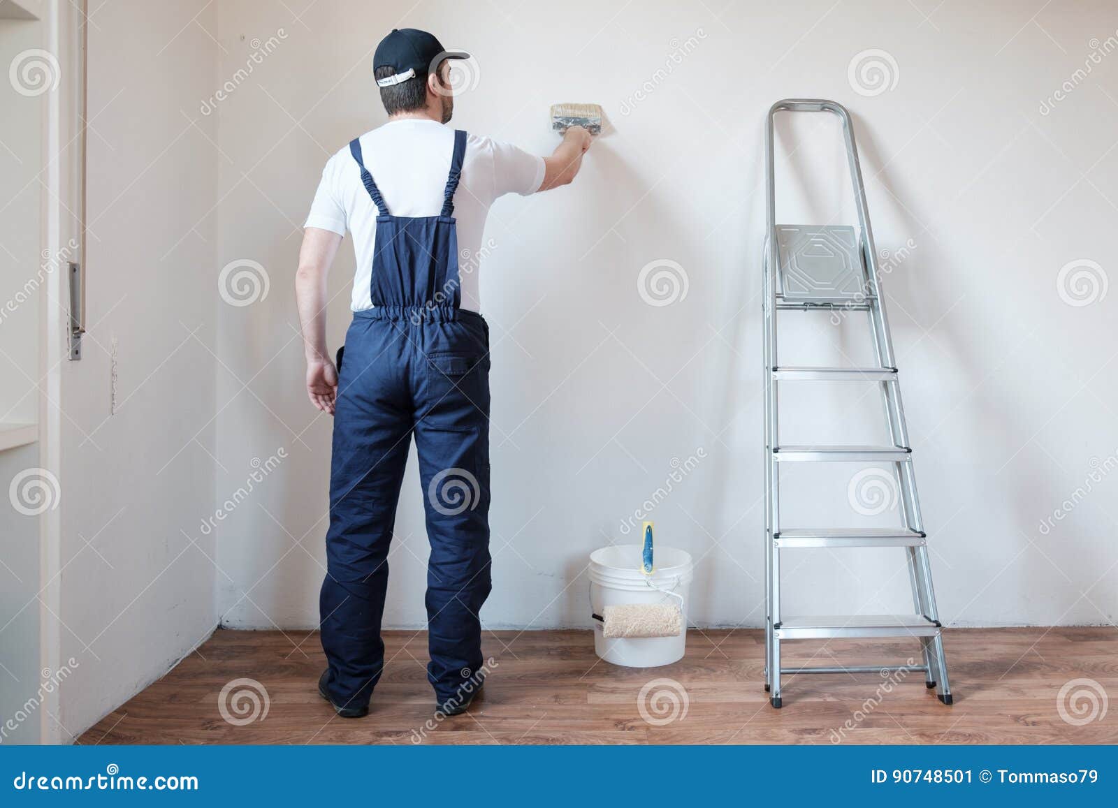 Professional Painter Worker is Painting One Wall Stock Image - Image of ...