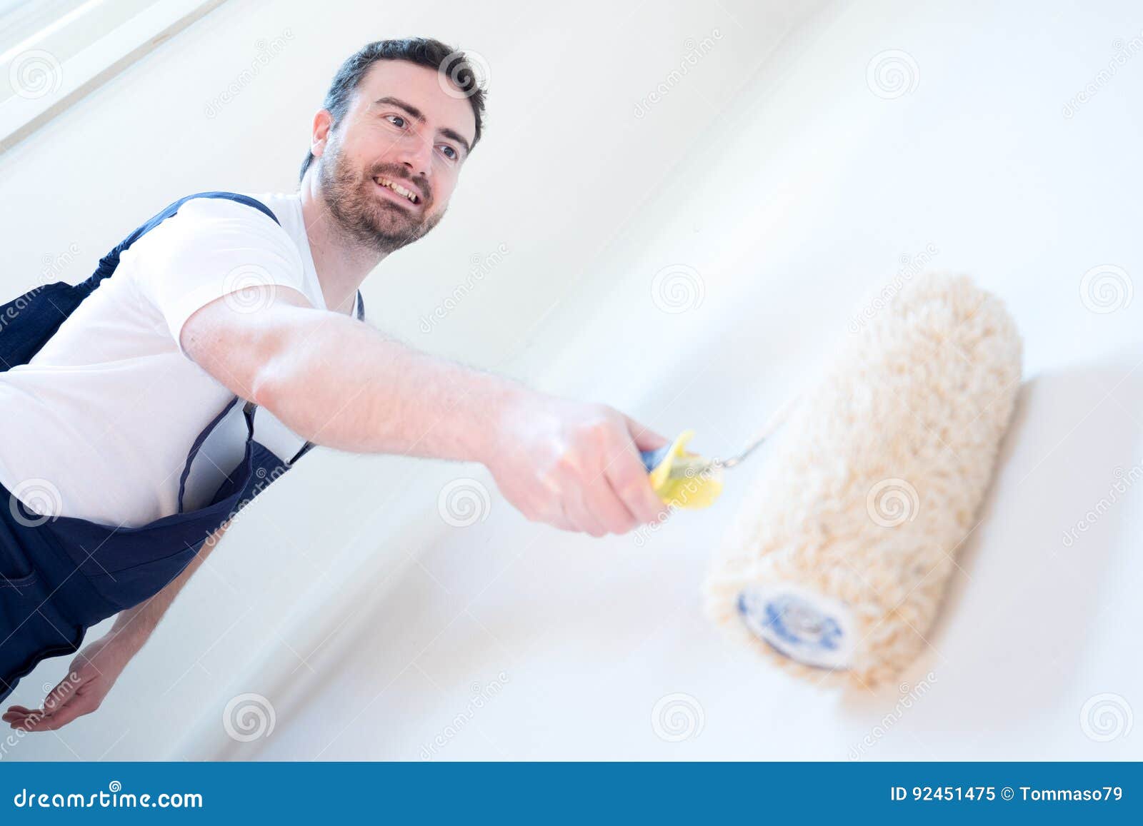 Professional Painter Worker is Painting One Wall Stock Image - Image of ...