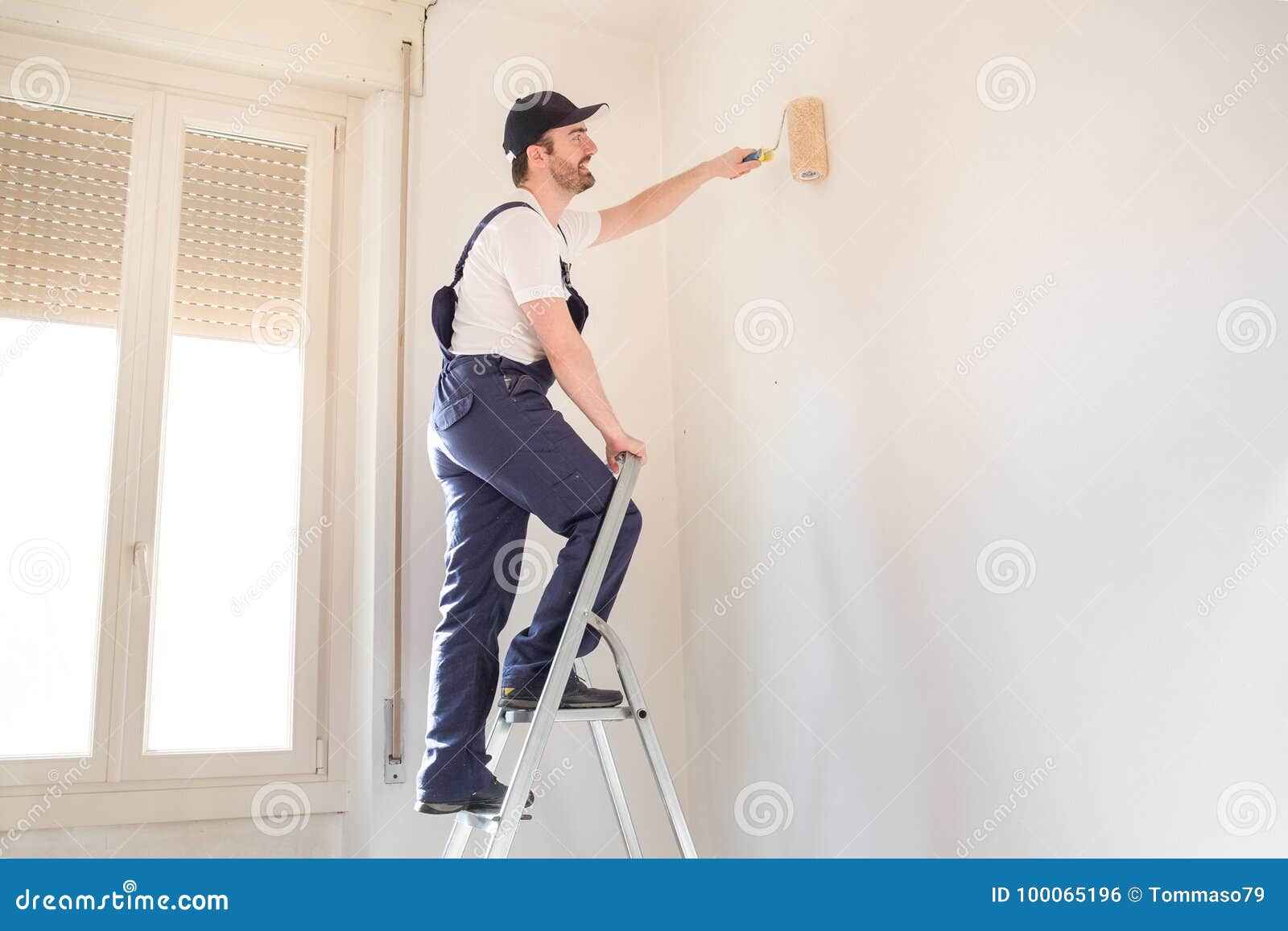 Professional Painter Worker is Painting One Wall Stock Photo - Image of ...