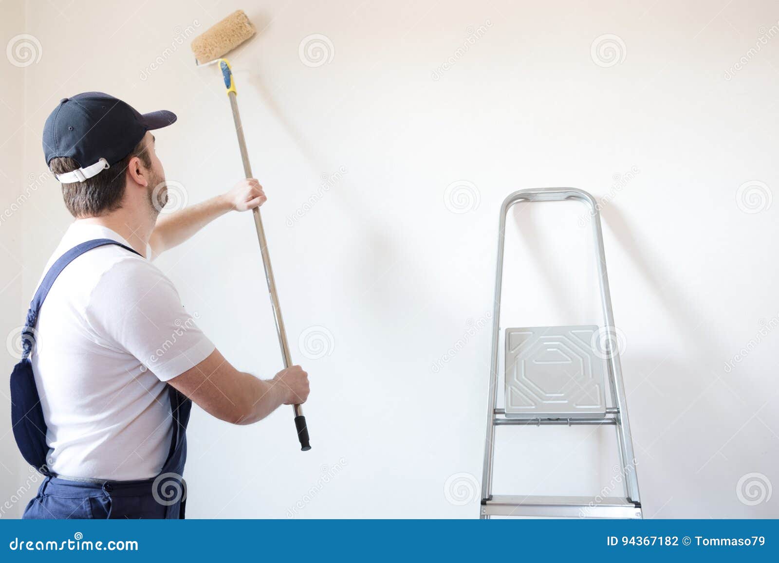Professional Painter Worker is Painting Wall Stock Photo - Image of ...