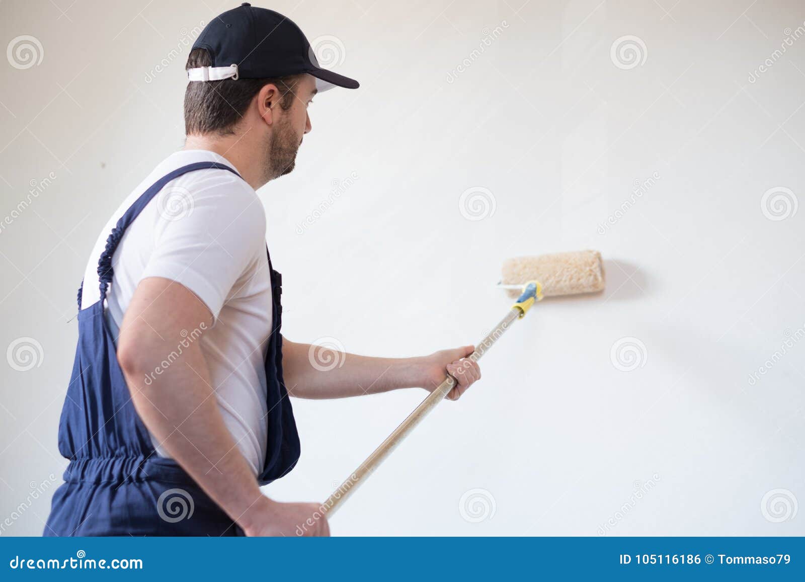 Professional Painter Worker is Painting One Wall Stock Photo - Image of ...
