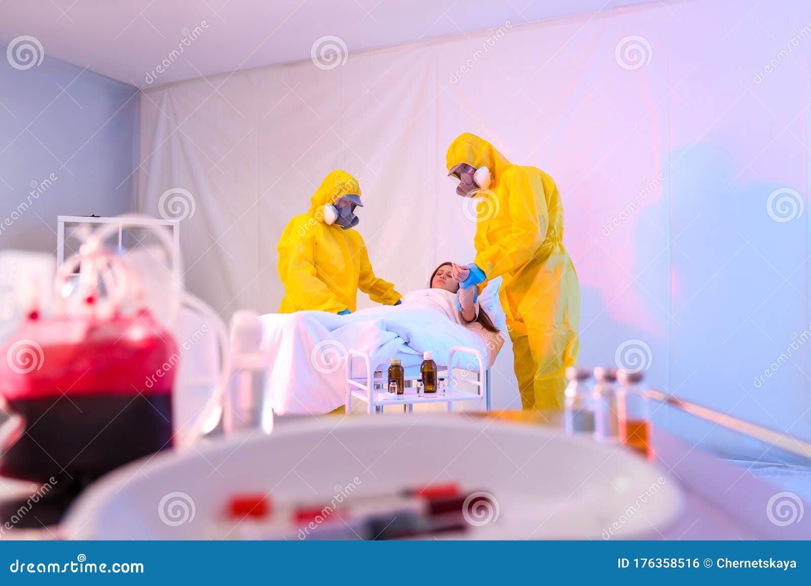 Professional Paramedics Examining Patient with Virus in Ward Stock ...
