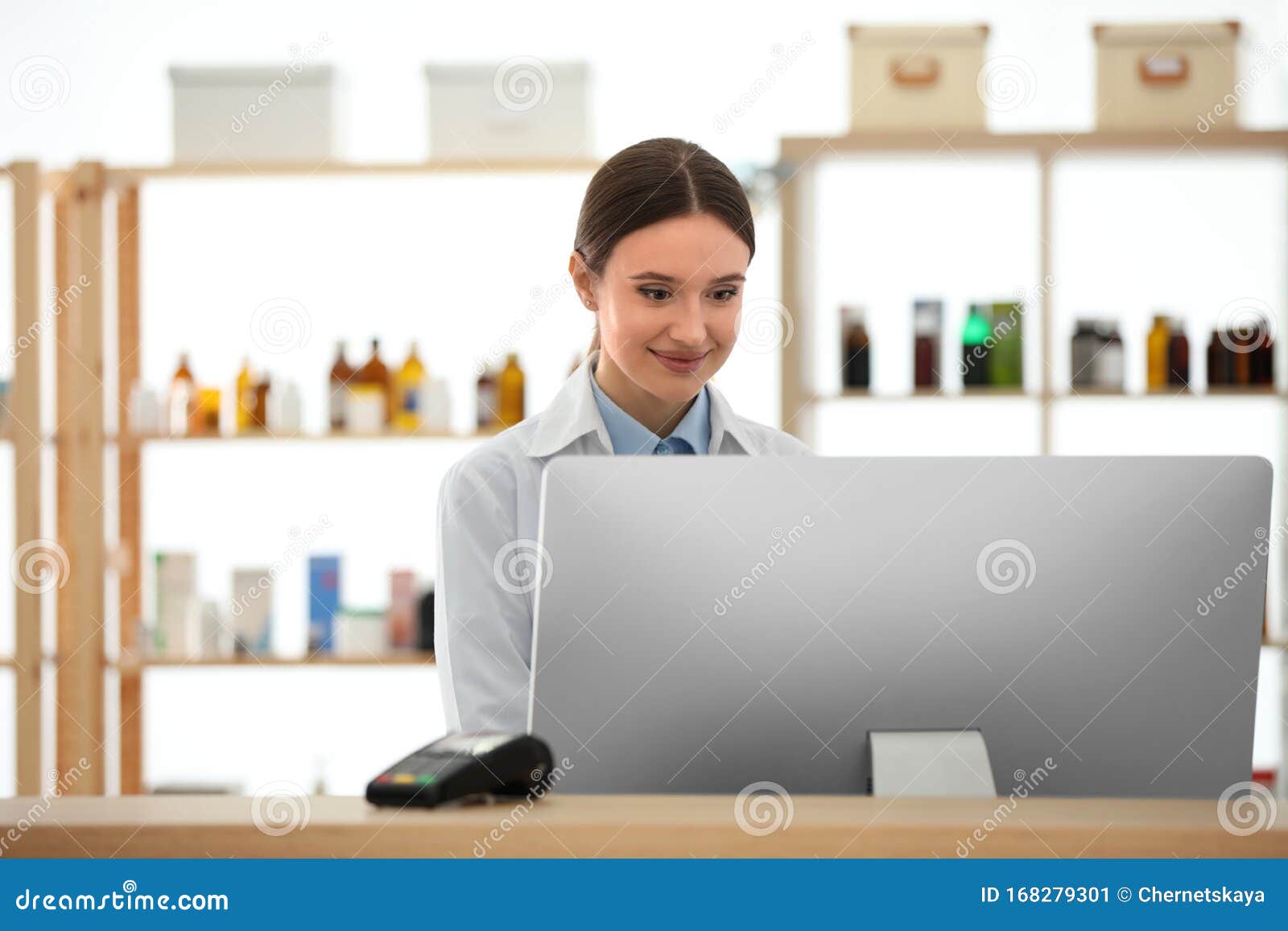 Professional Pharmacist Working with Computer in Drugstore Stock Image ...