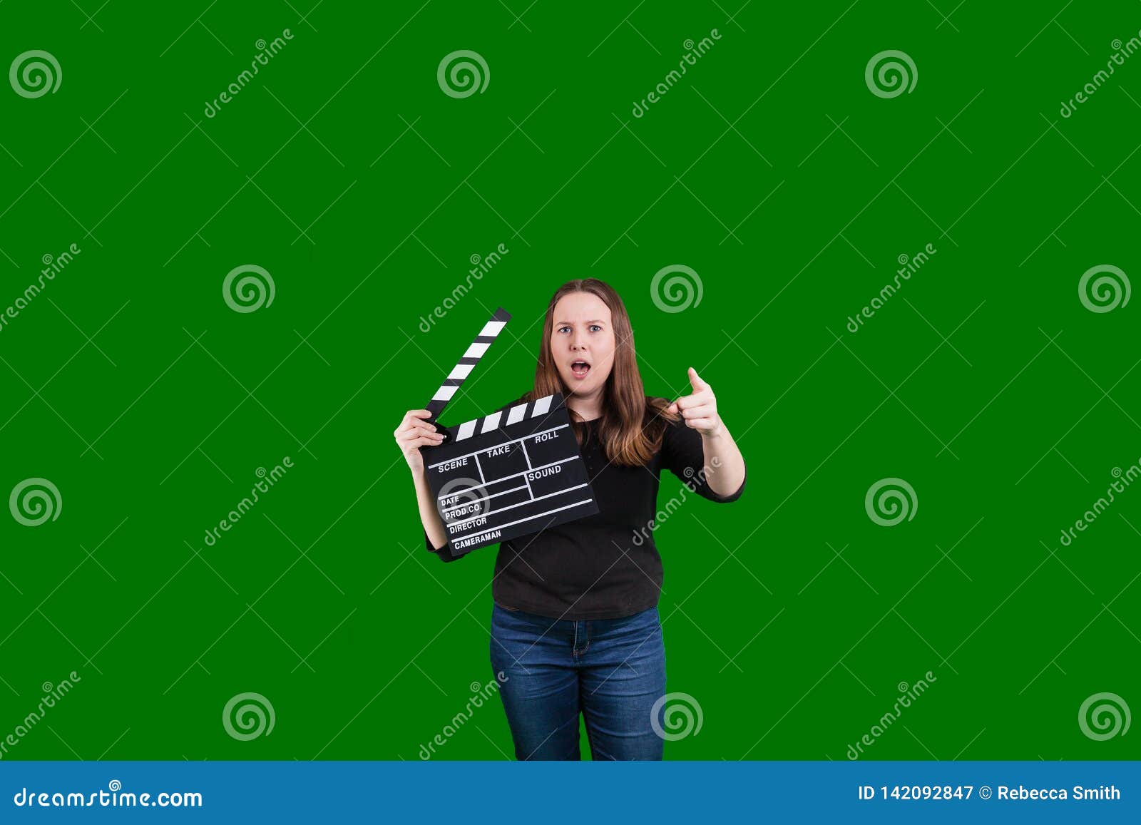 Young Female Pointing Finger Using a Movie Clapperboard Stock Image ...