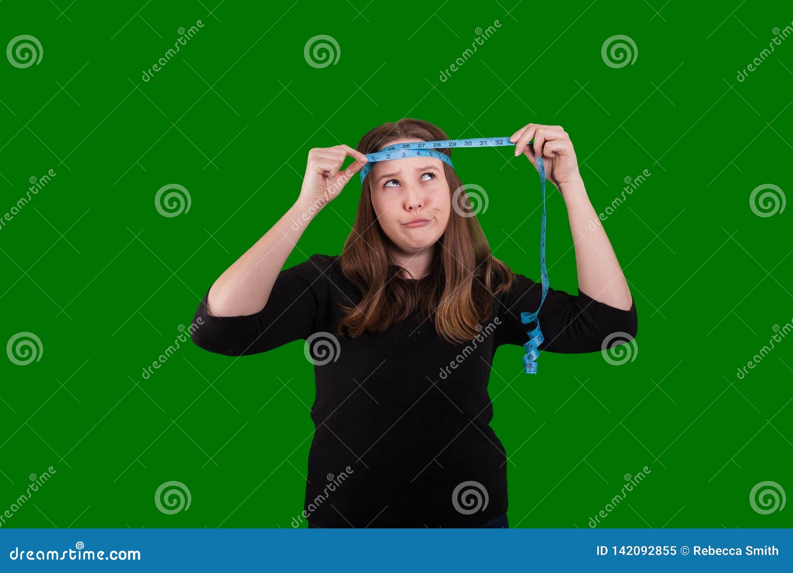 Women Measuring Her Head with Rolling Measuring Tape Frustrated ...