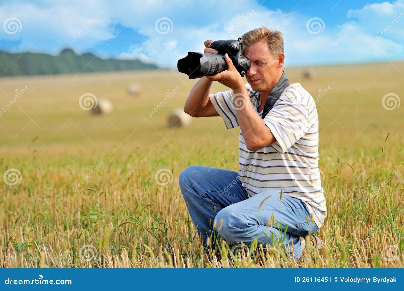 Professional photographer stock image. Image of grass - 26116451