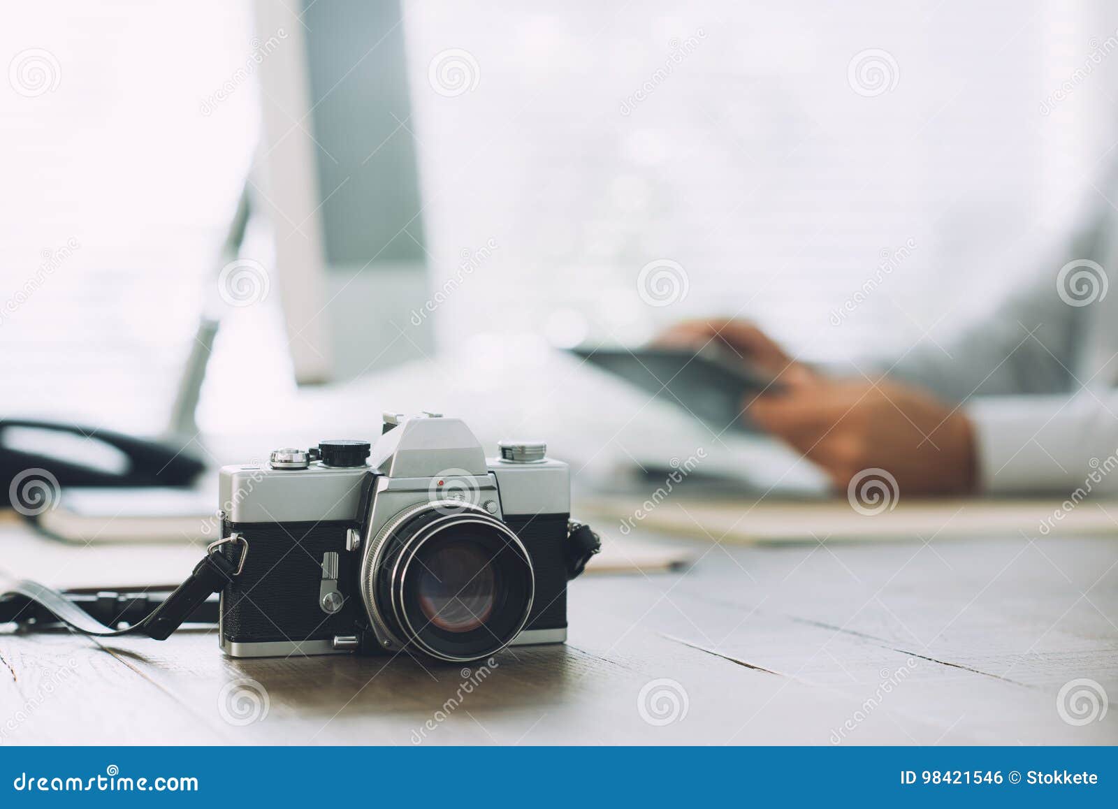 Professional Photographer Working In The Studio With A Male Model On A ...