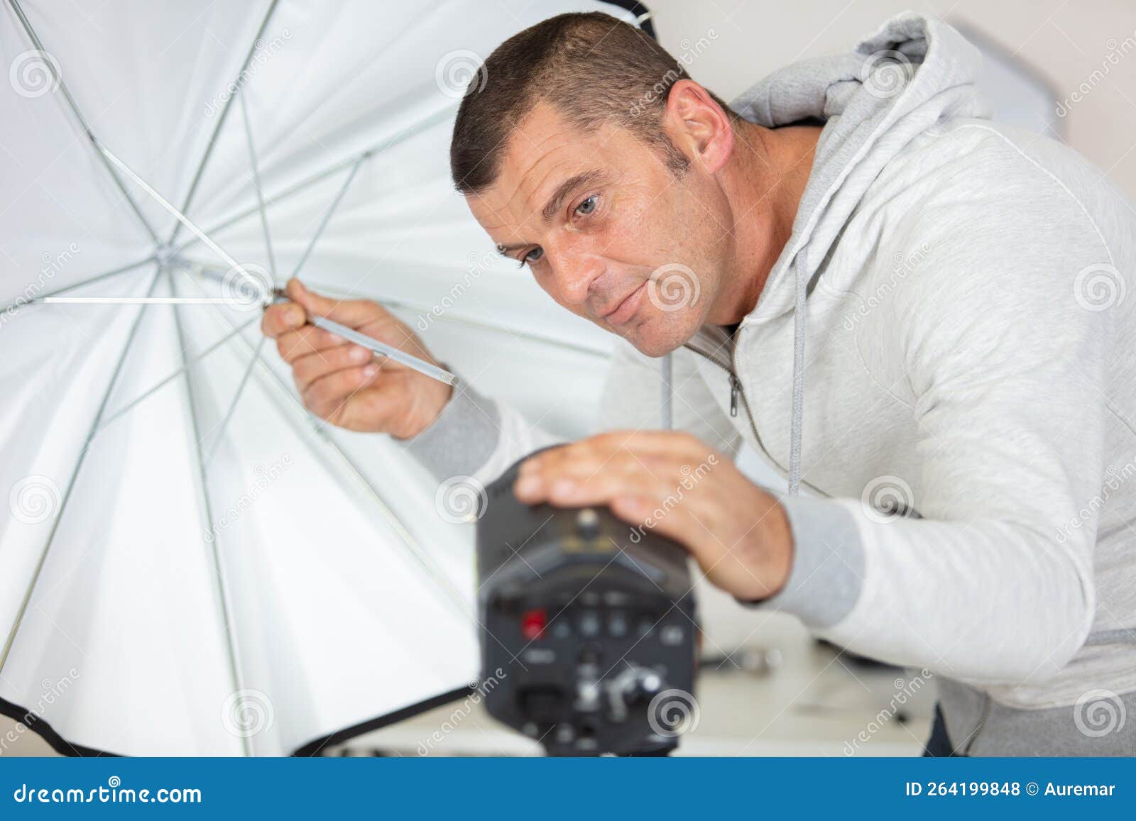 Professional Photographer Preparing To Take Pictures Stock Photo ...