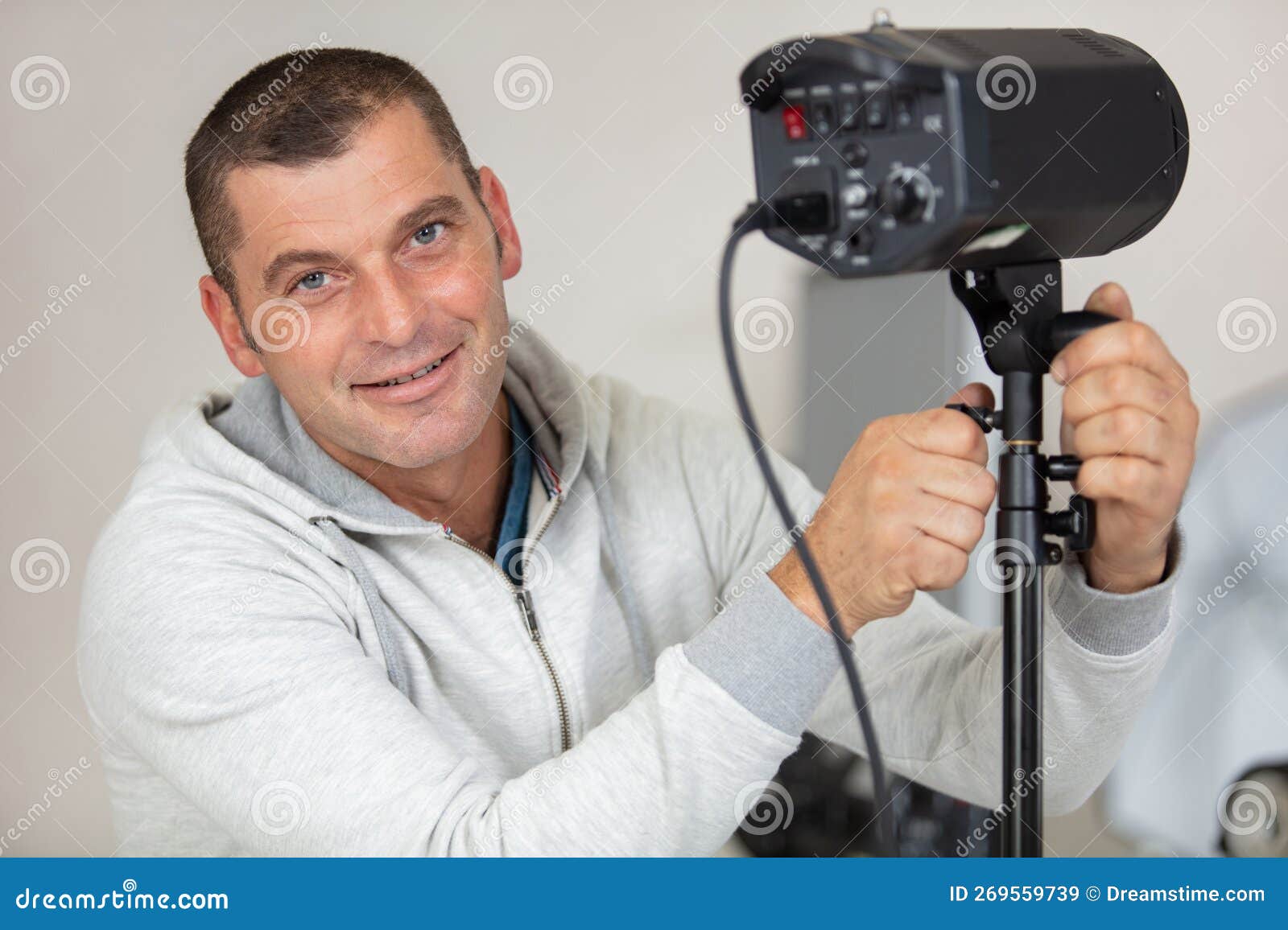 Professional Photographer Setting Up Studio Lighting Stock Image ...