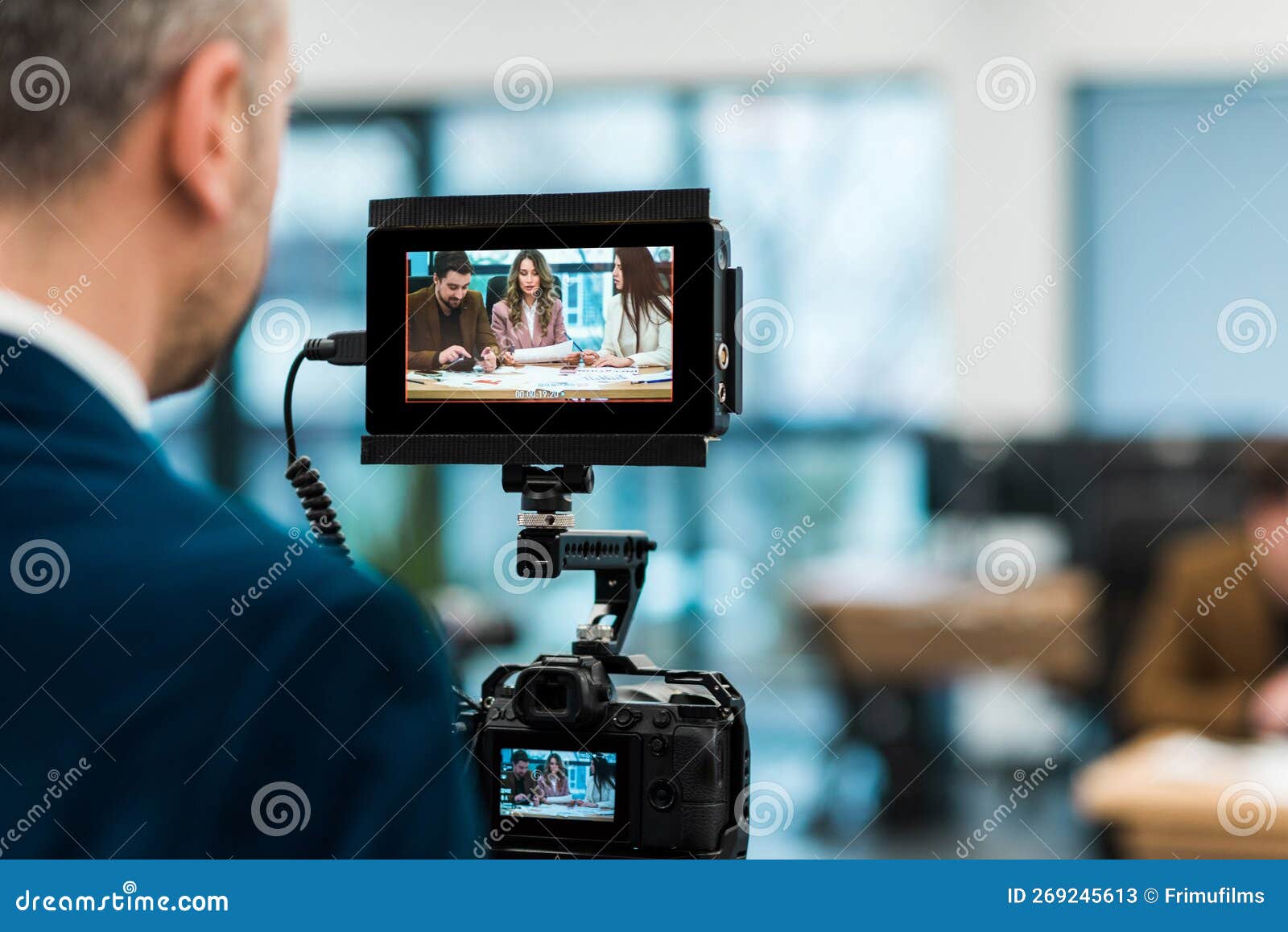 Professional Photographer Shooting a Business Meeting in an Office ...