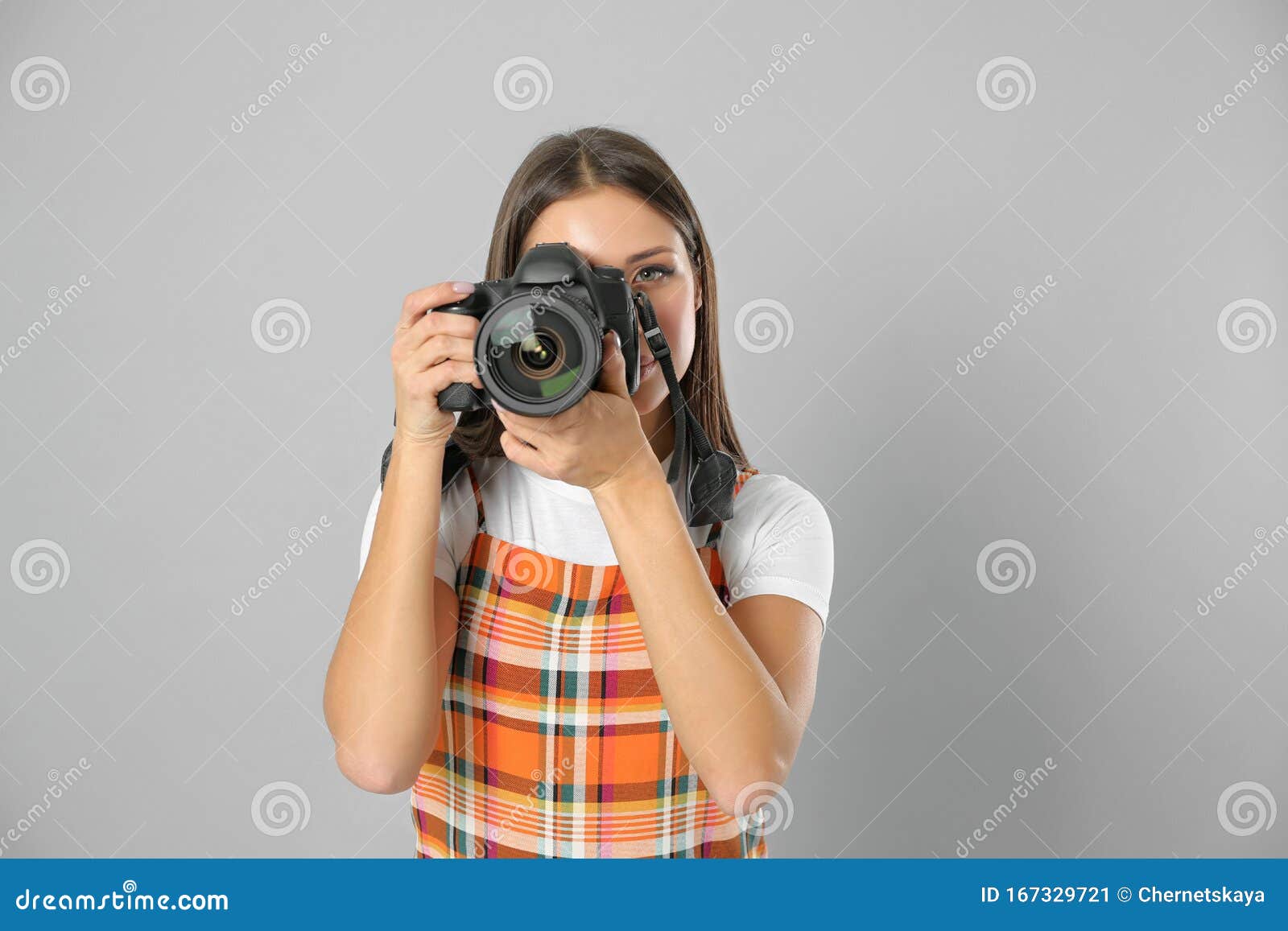Professional Photographer Working on Grey Background in Studio Stock ...