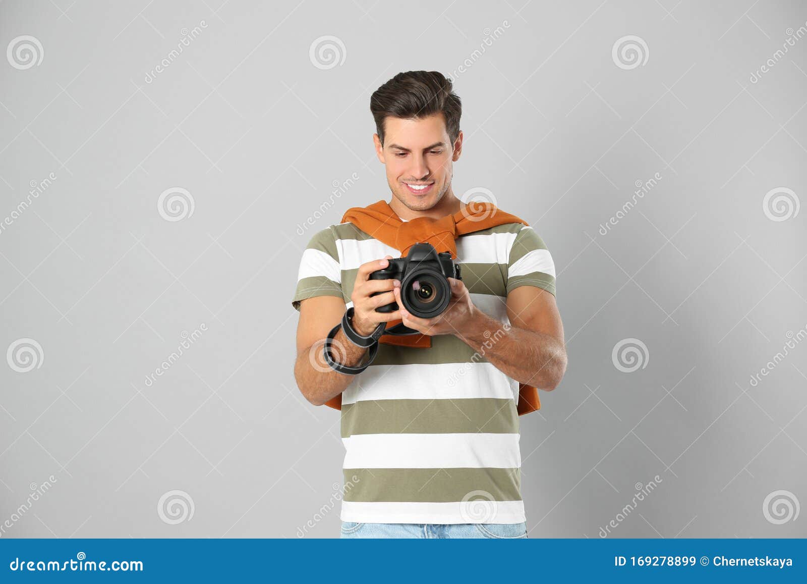 Professional Photographer Working on Light Grey in Studio Stock Image ...