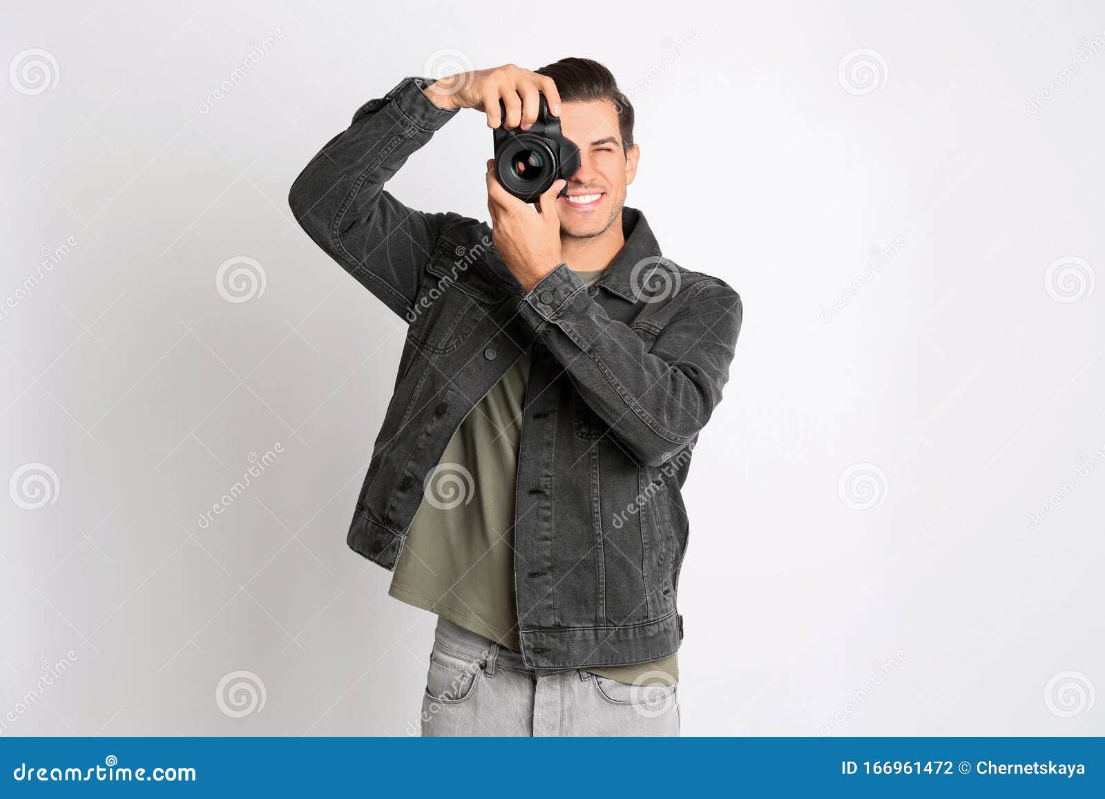 Professional Photographer Working on White in Studio Stock Photo ...
