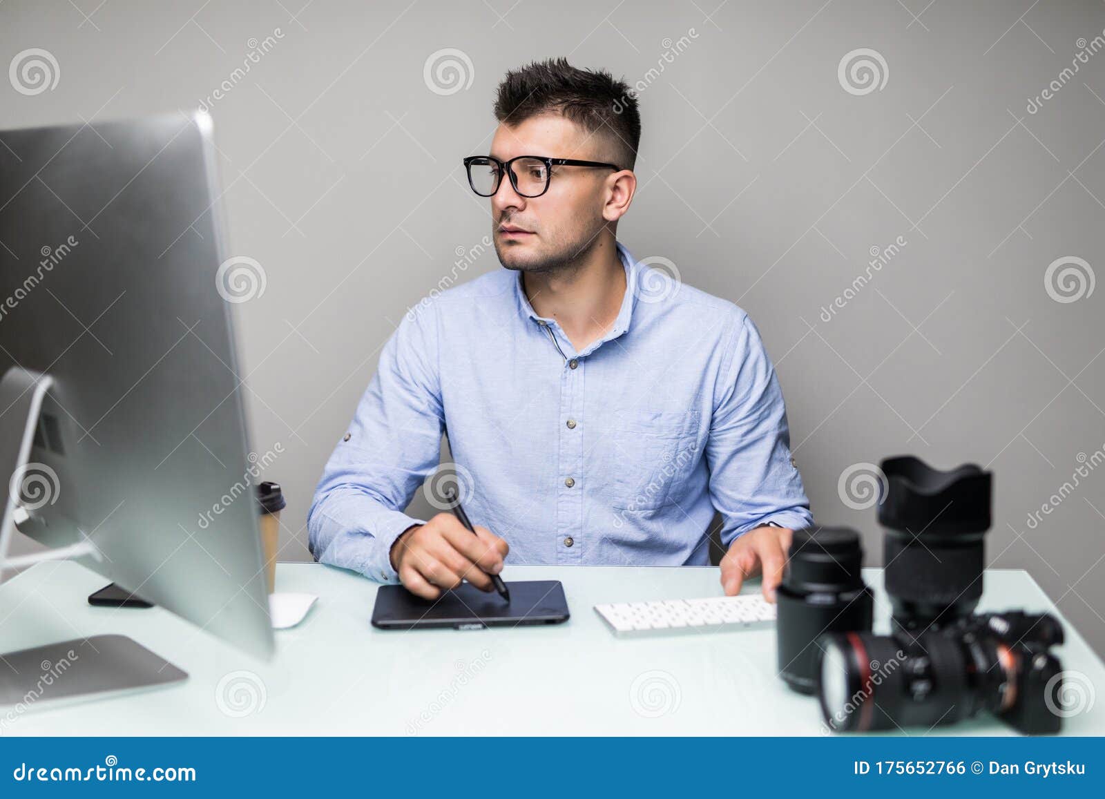 Professional Young Photographer Works in Photo Editing Software on ...