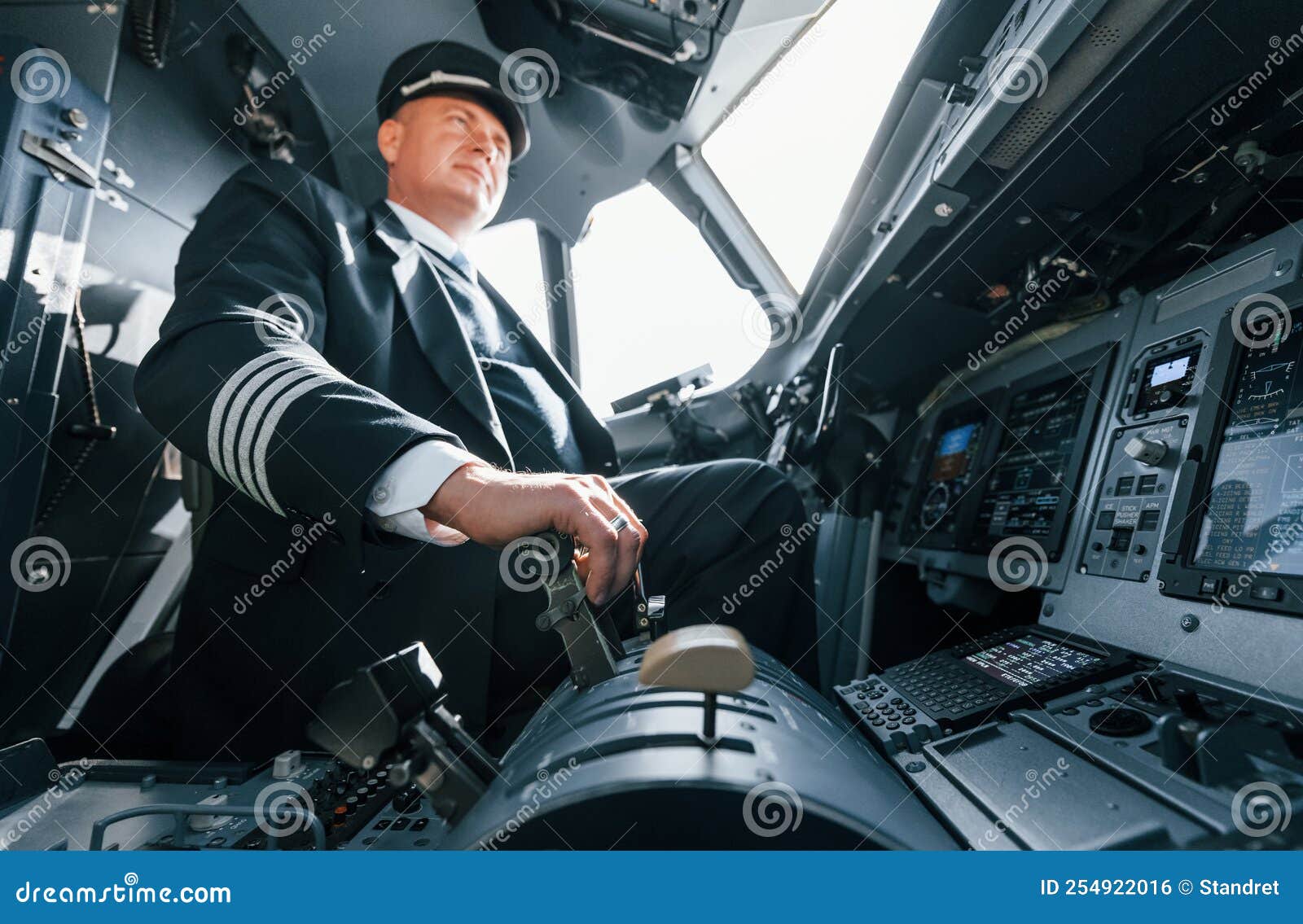A Professional Pilot is in the Cockpit. Conception of Work Stock Photo ...