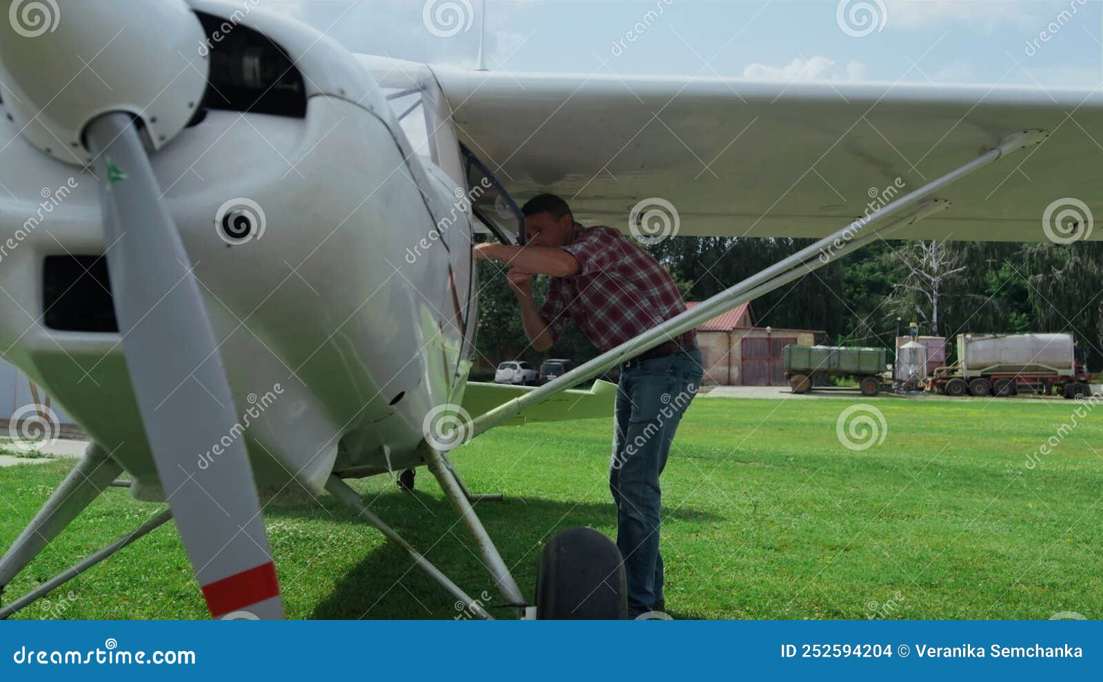 Professional Pilot Airplane Making Preflight Inspection Process ...