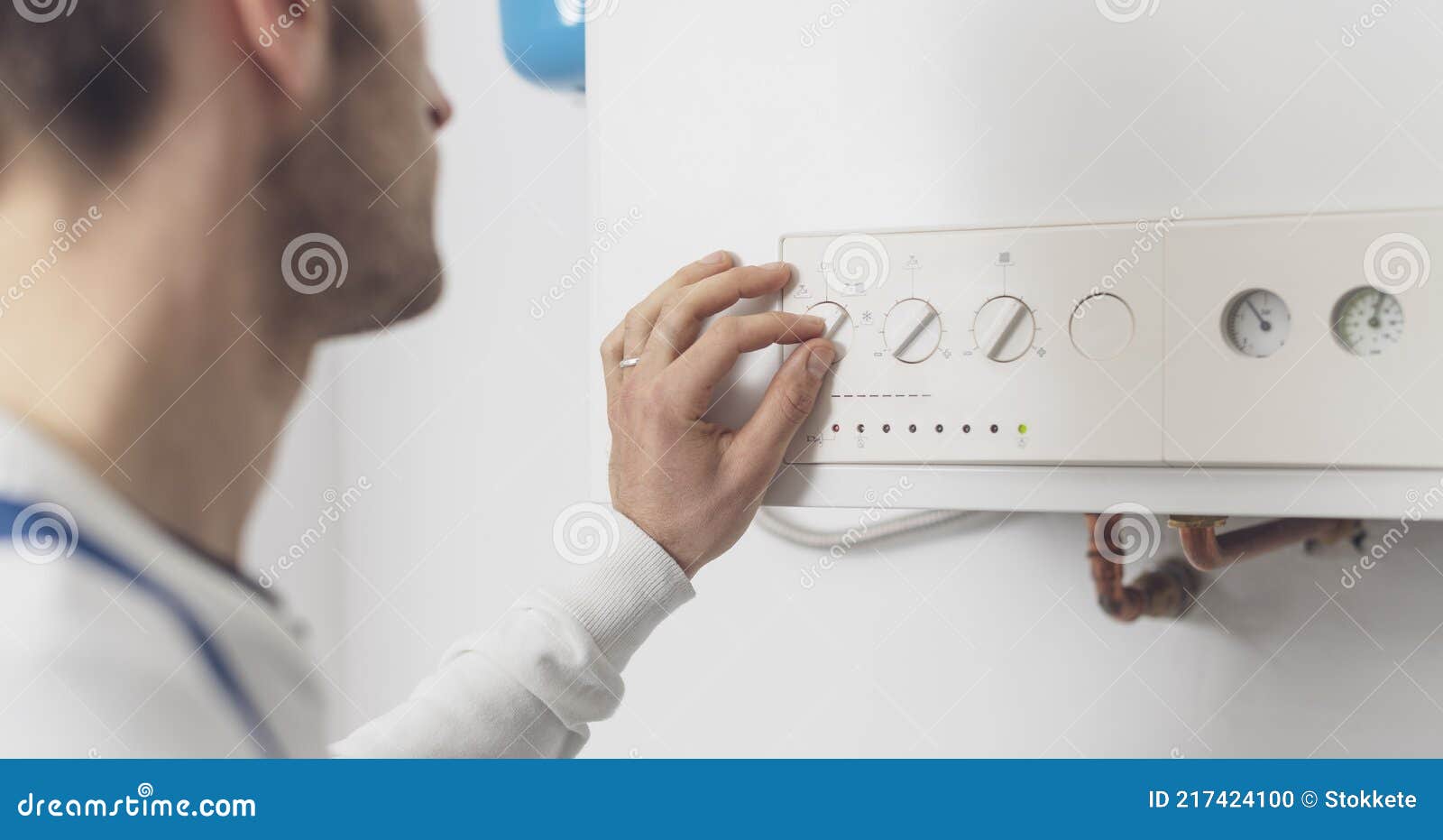 Professional Plumber Checking a Boiler Control Panel Stock Photo ...