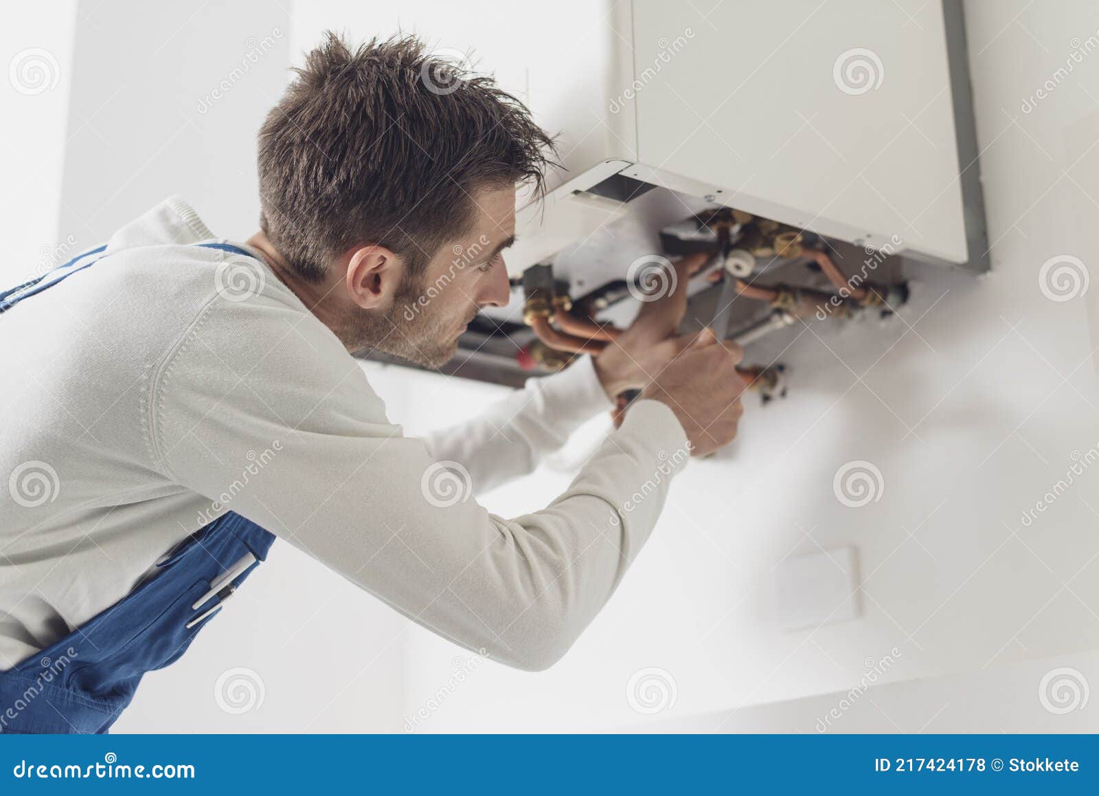 Professional Plumber Checking a Boiler Stock Photo - Image of house ...