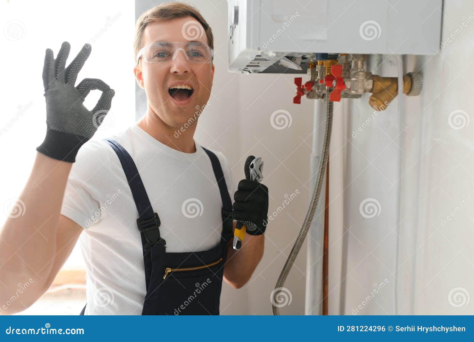 Professional Plumber Checking a Boiler and Pipes, Boiler Service ...
