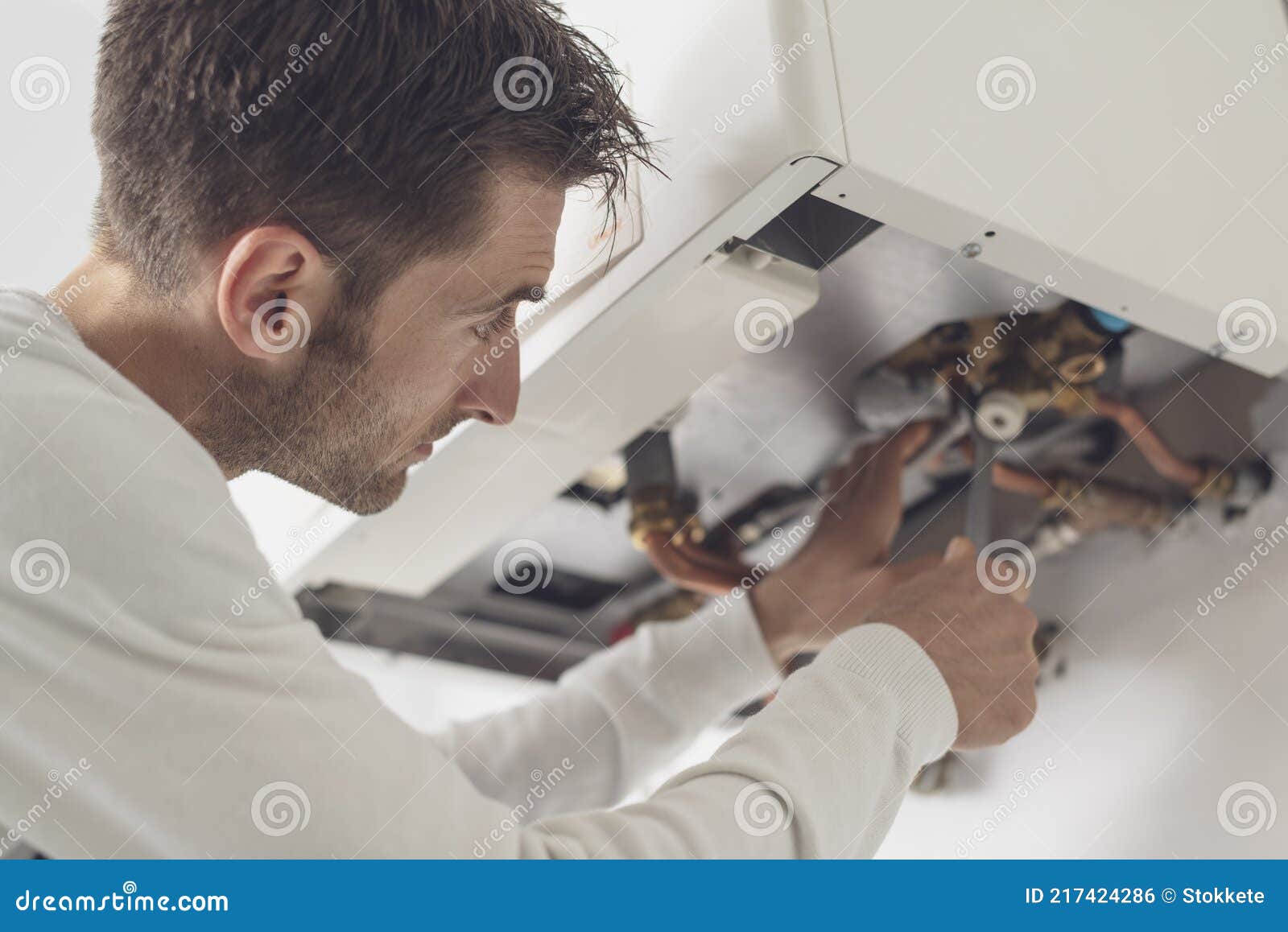 Professional Plumber Checking a Boiler Stock Photo - Image of checking ...