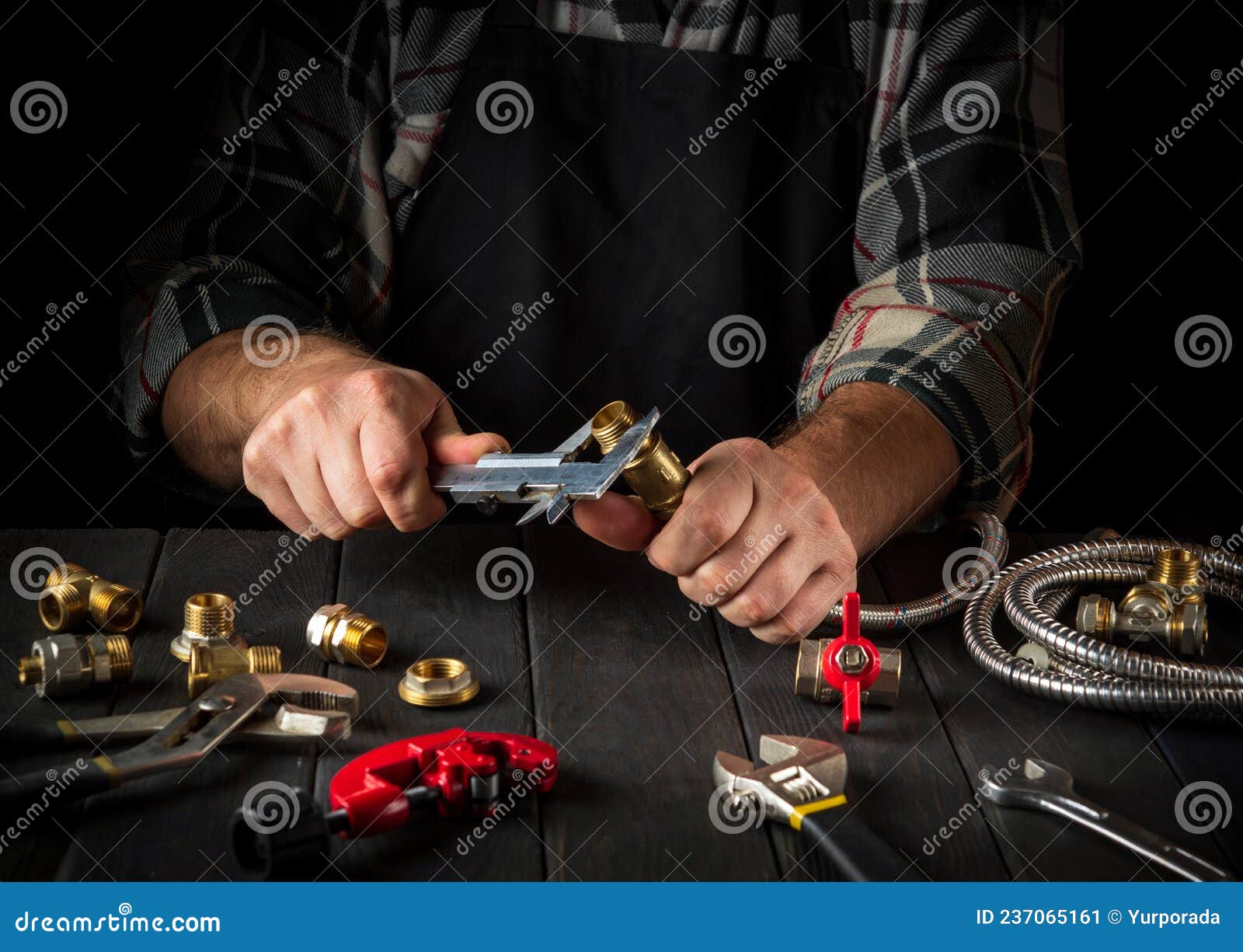 Professional Plumber Measures the Diameter of a Fitting with a Caliper ...