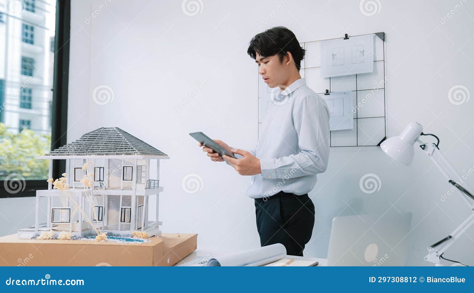Professional Project Manager Using Tablet To Check House Model ...
