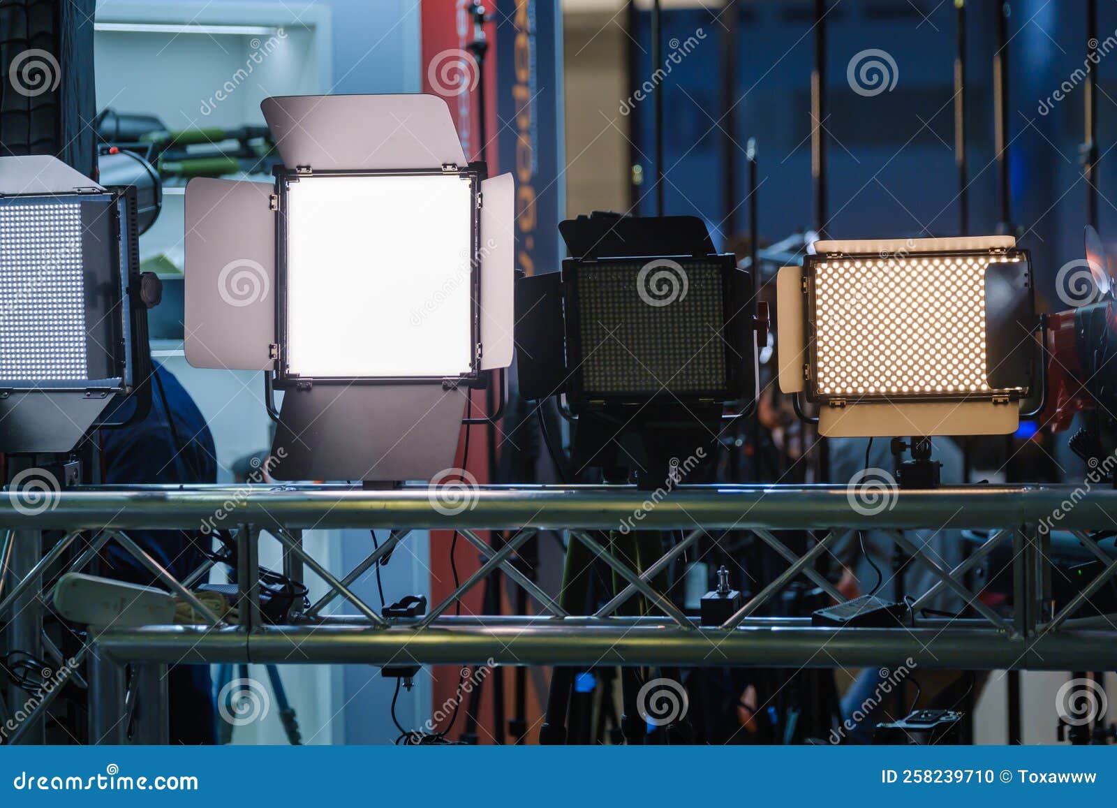 Professional Projector Lamps on Metal Rack in Studio Stock Photo ...