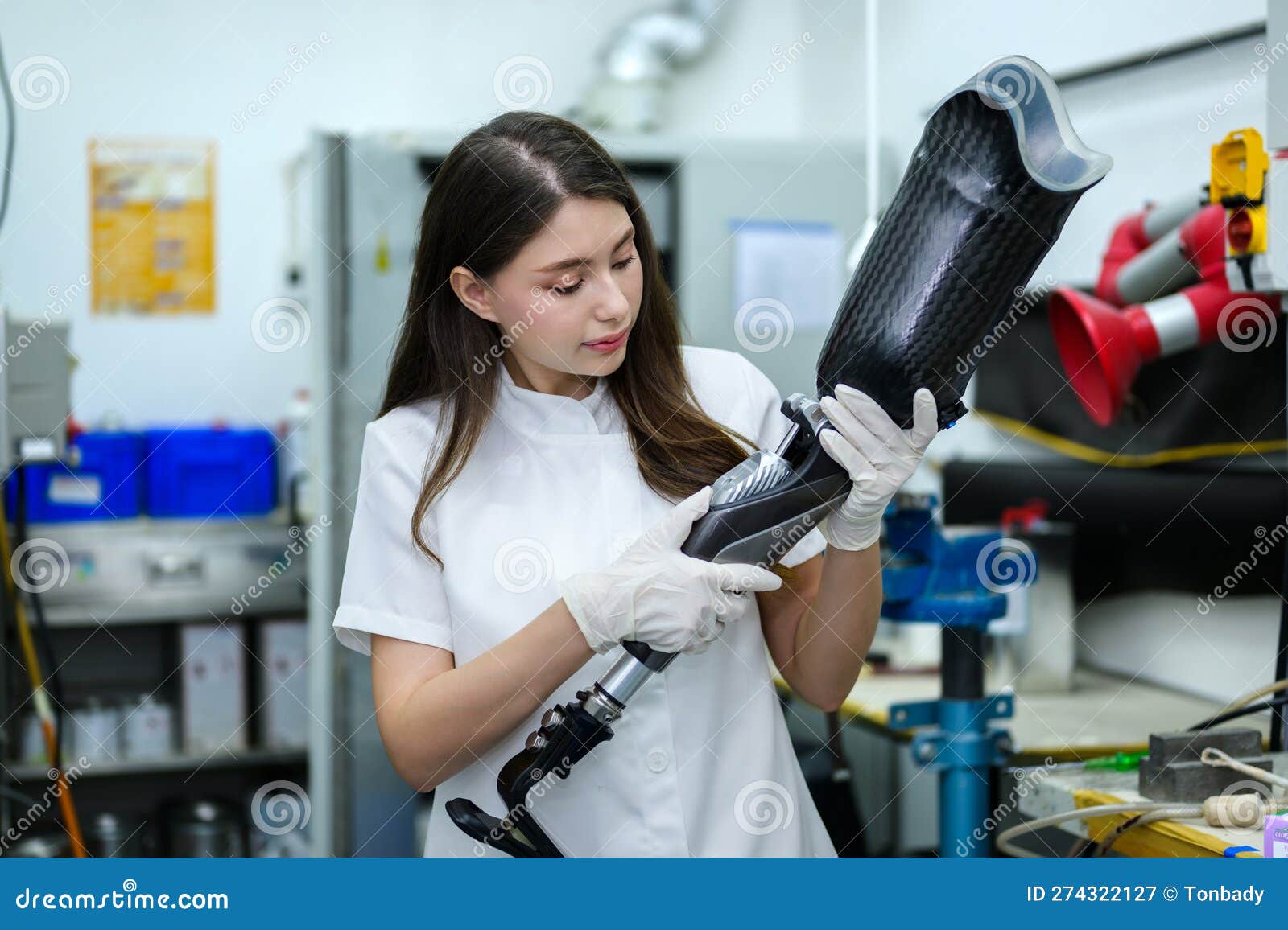 Prosthetic Technician Holding Prosthetic Leg Checking and Controlling ...