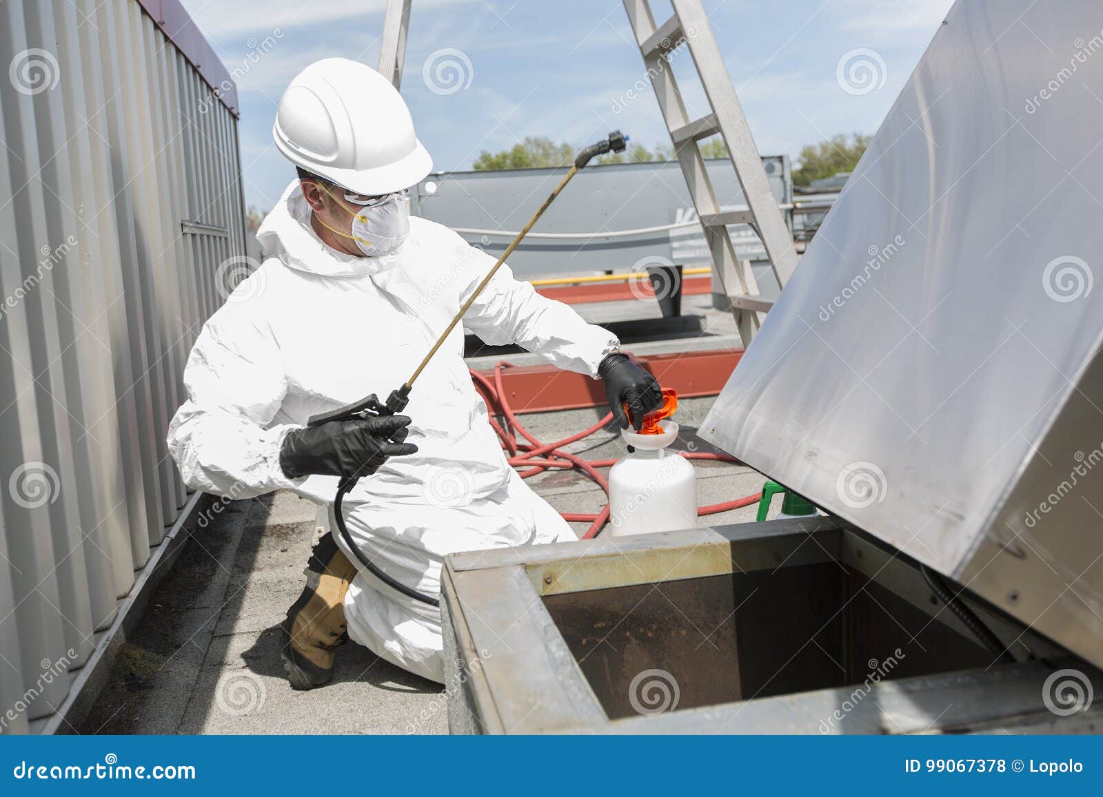 Professional in Protective Uniform, Mask, Gloves in the Roof for ...