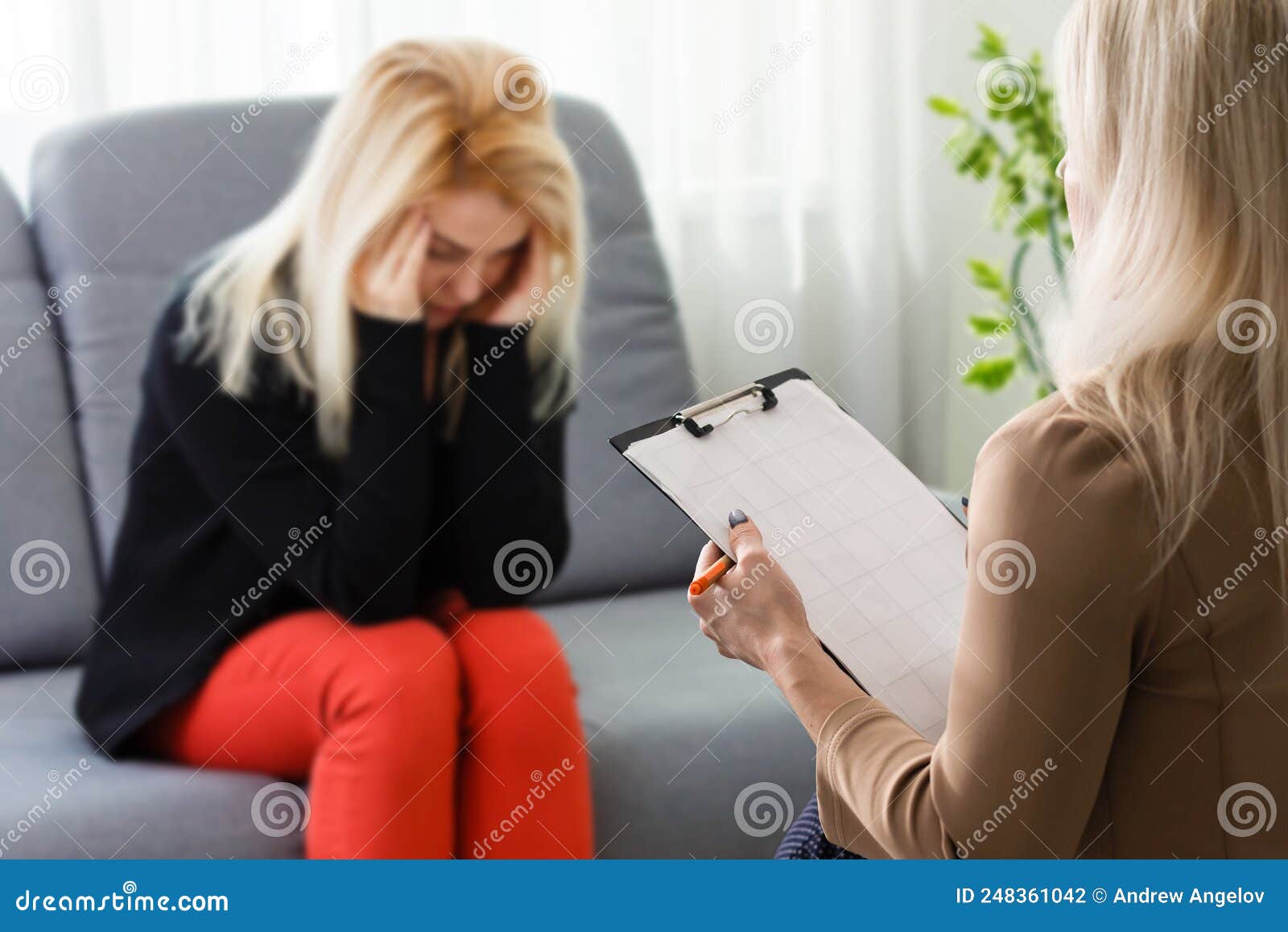 Professional Psychologist Conducting a Consultation. Stock Photo ...