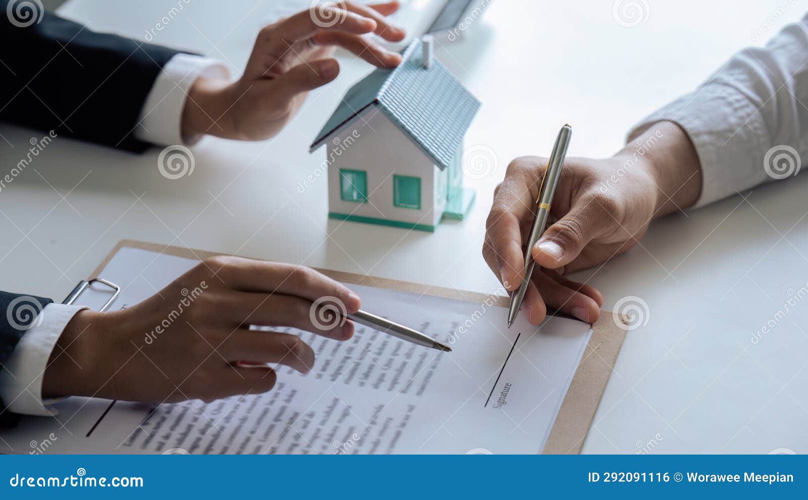 Professional Real Estate Agent Guiding and Explaining the Document ...